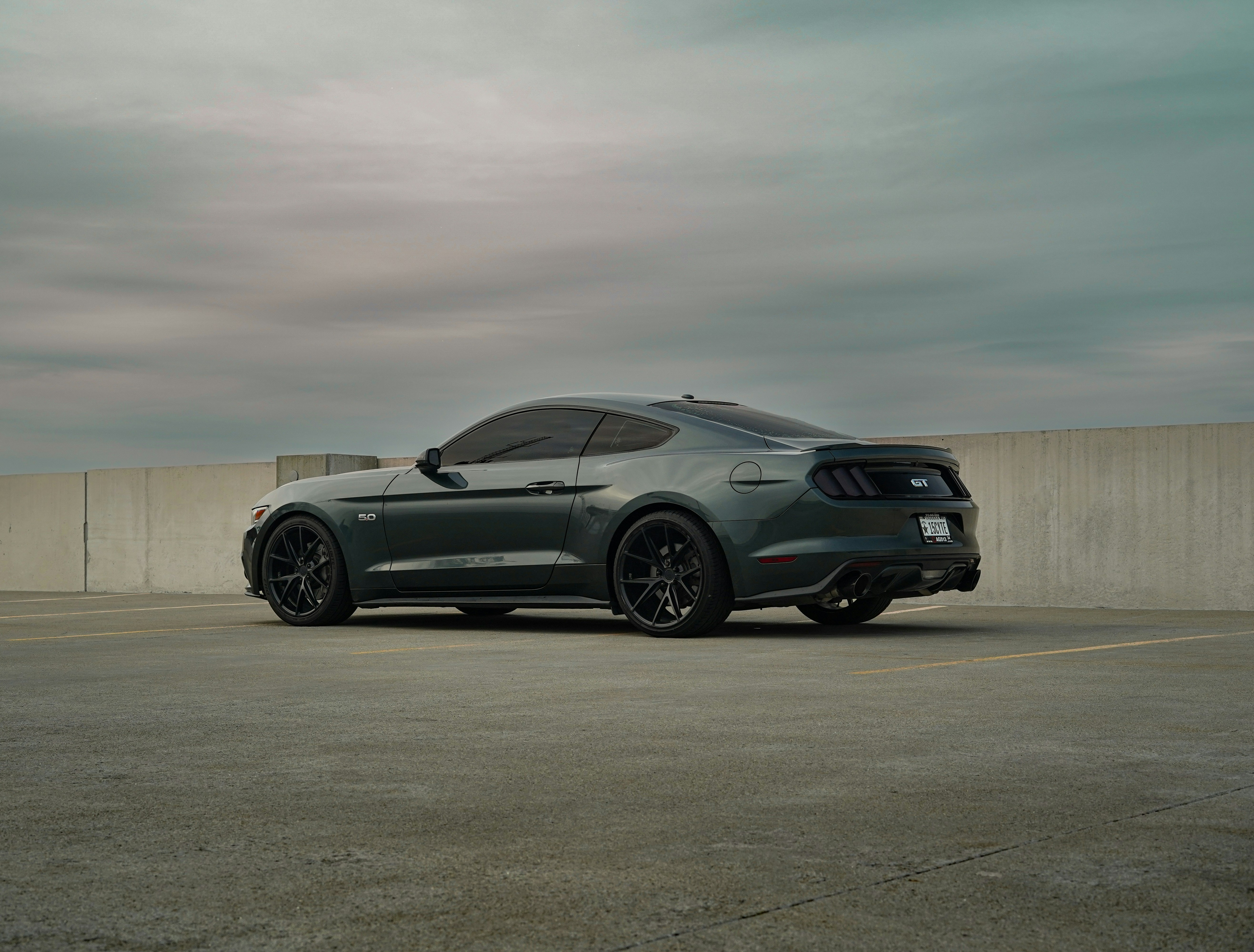 Midnight Green Mustang on a Quiet Roof Top