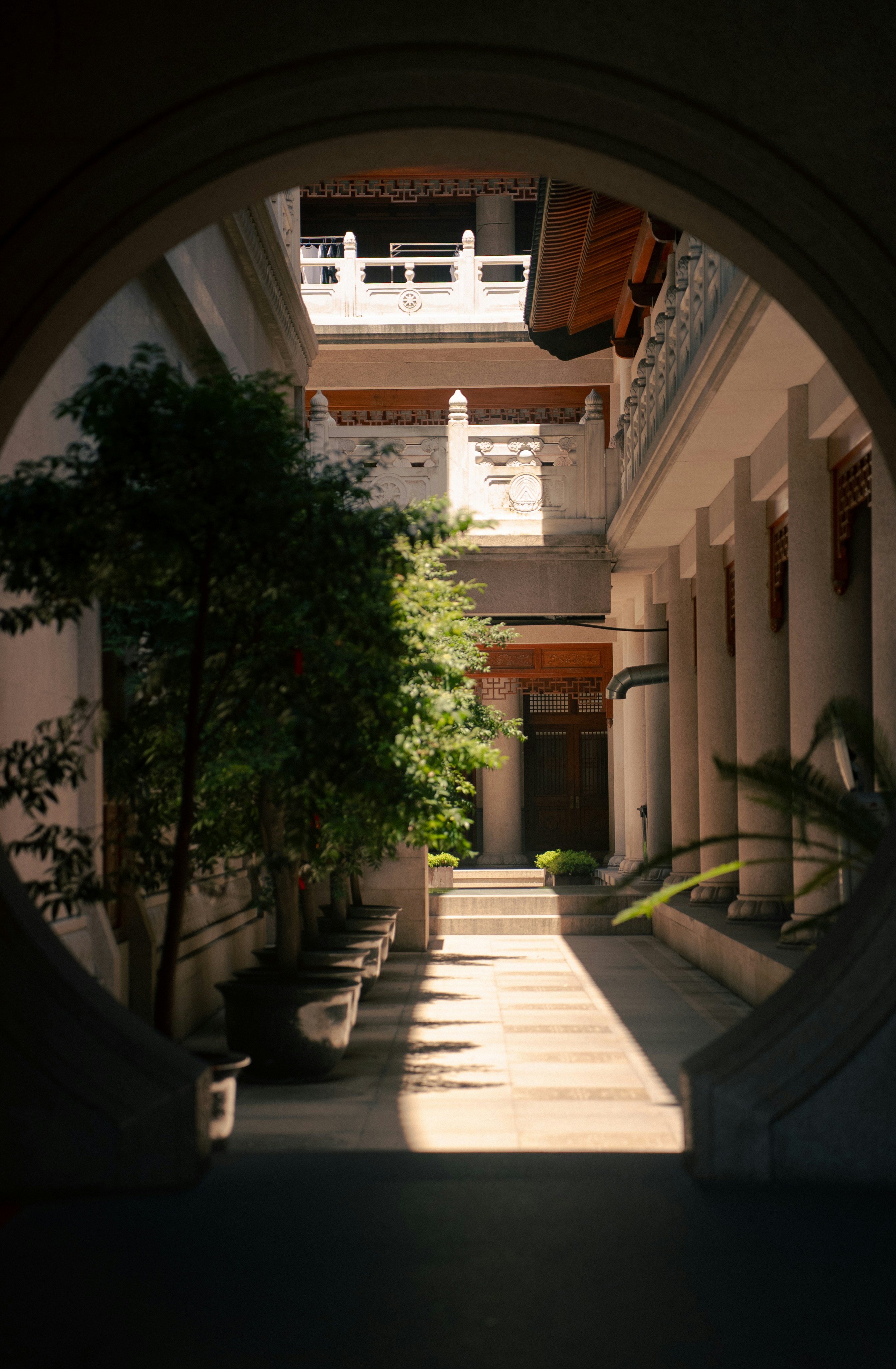 Circular Portal to a Quiet Courtyard