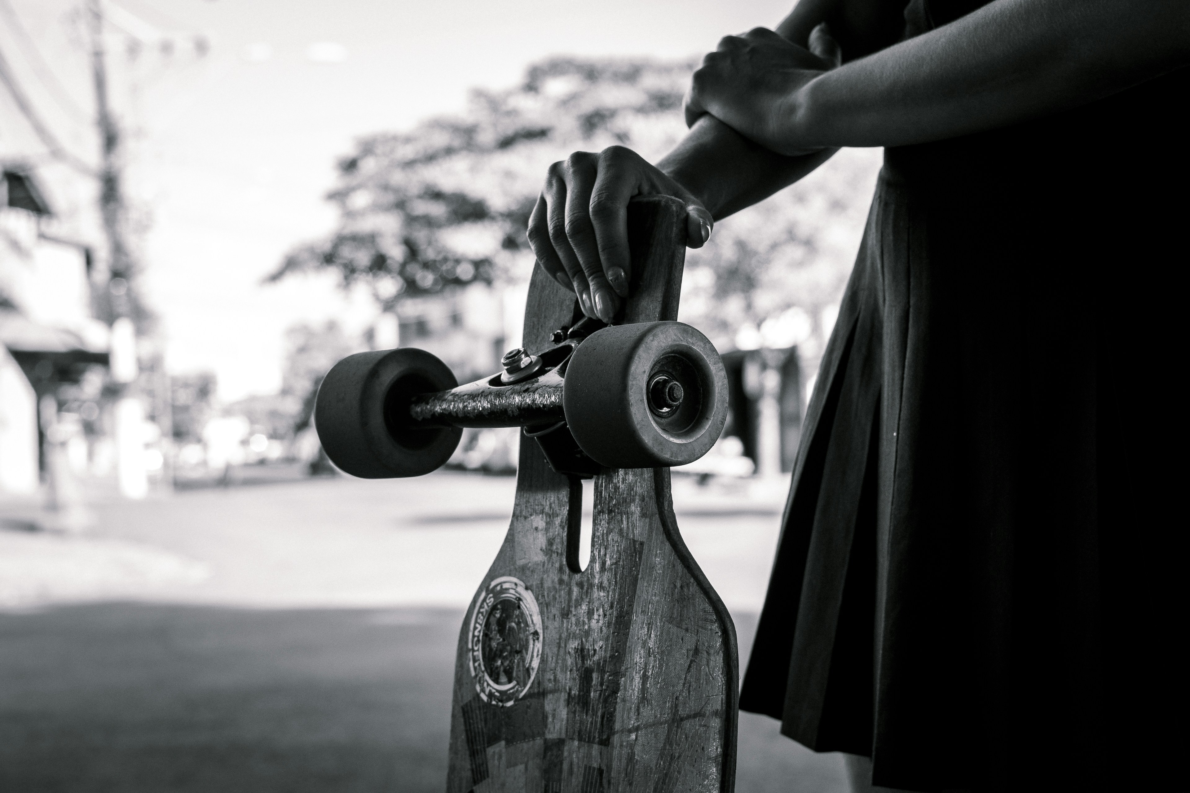 Quiet Balance: A Hand on the Ride of a Skater