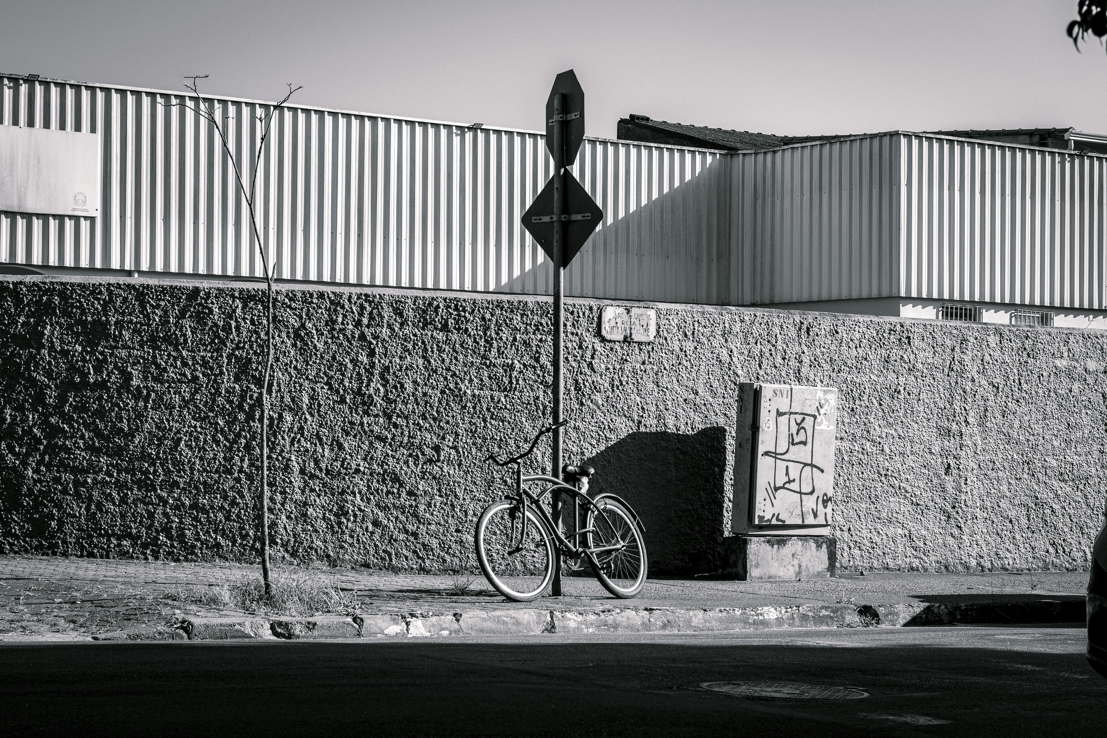 Street Corner Silence: A Bicycle at the Edge of Light