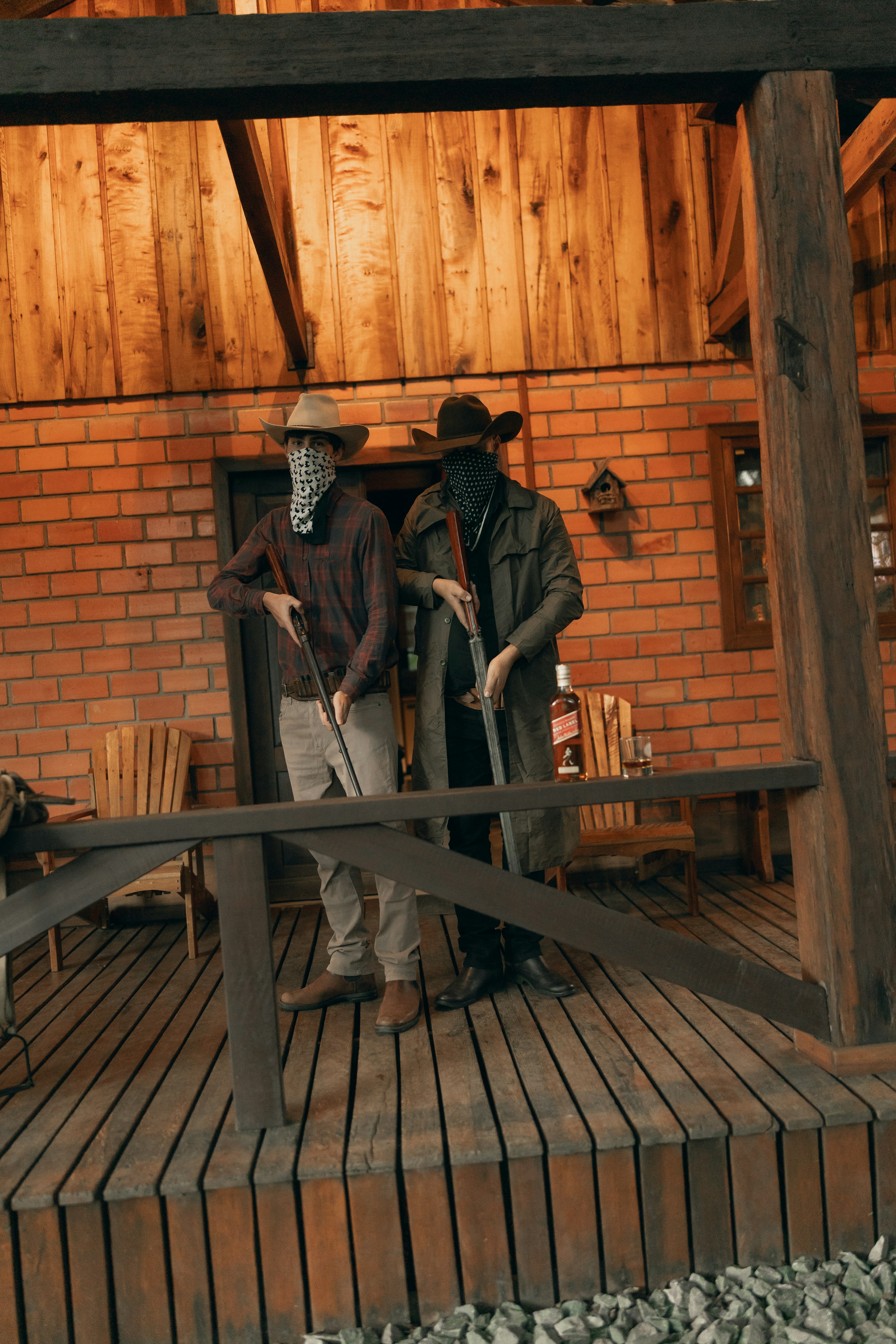 Masked Guardians on a Rustic Veranda