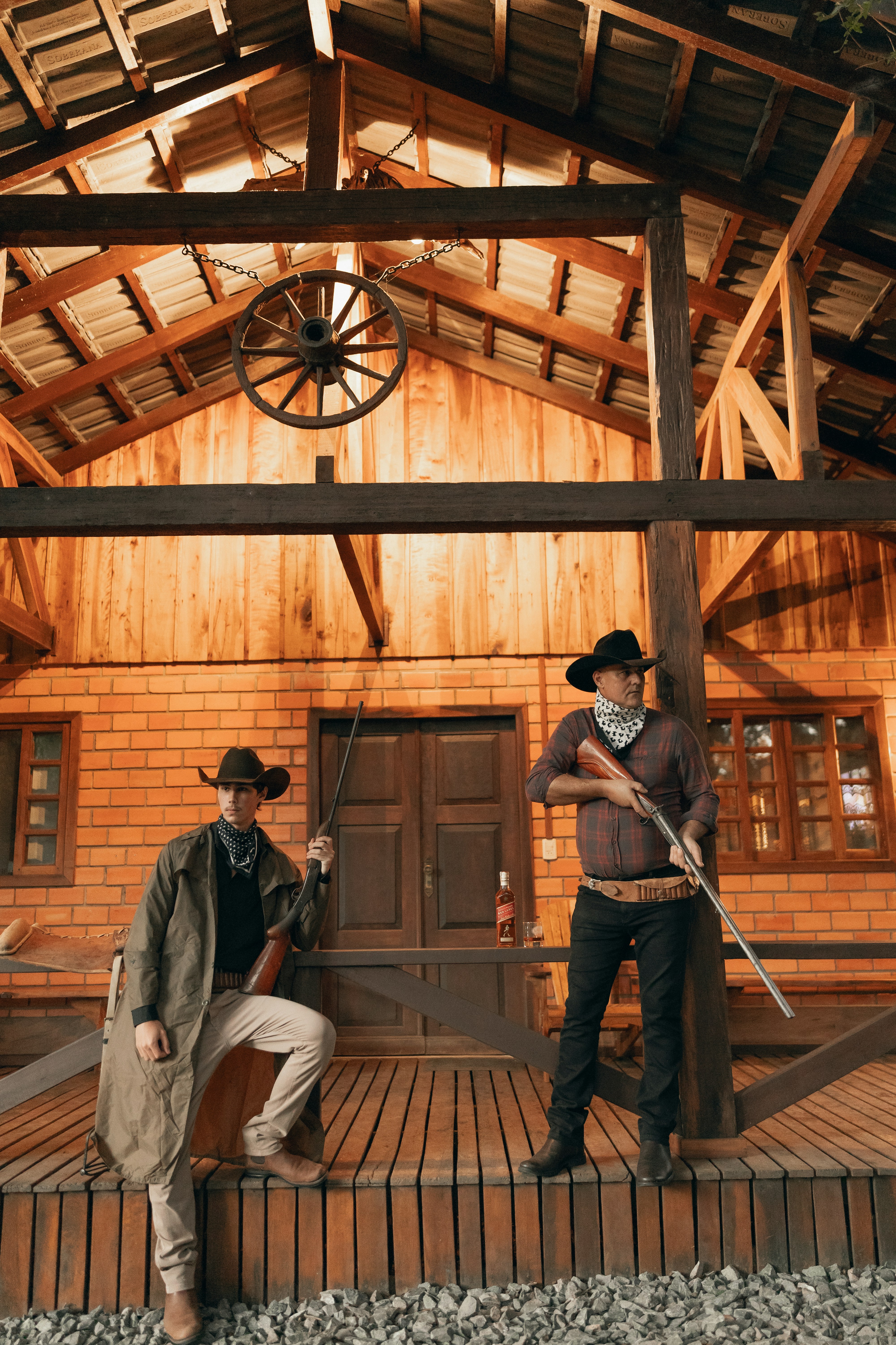 Western Heritage duo at a rustic wooden frontier porch