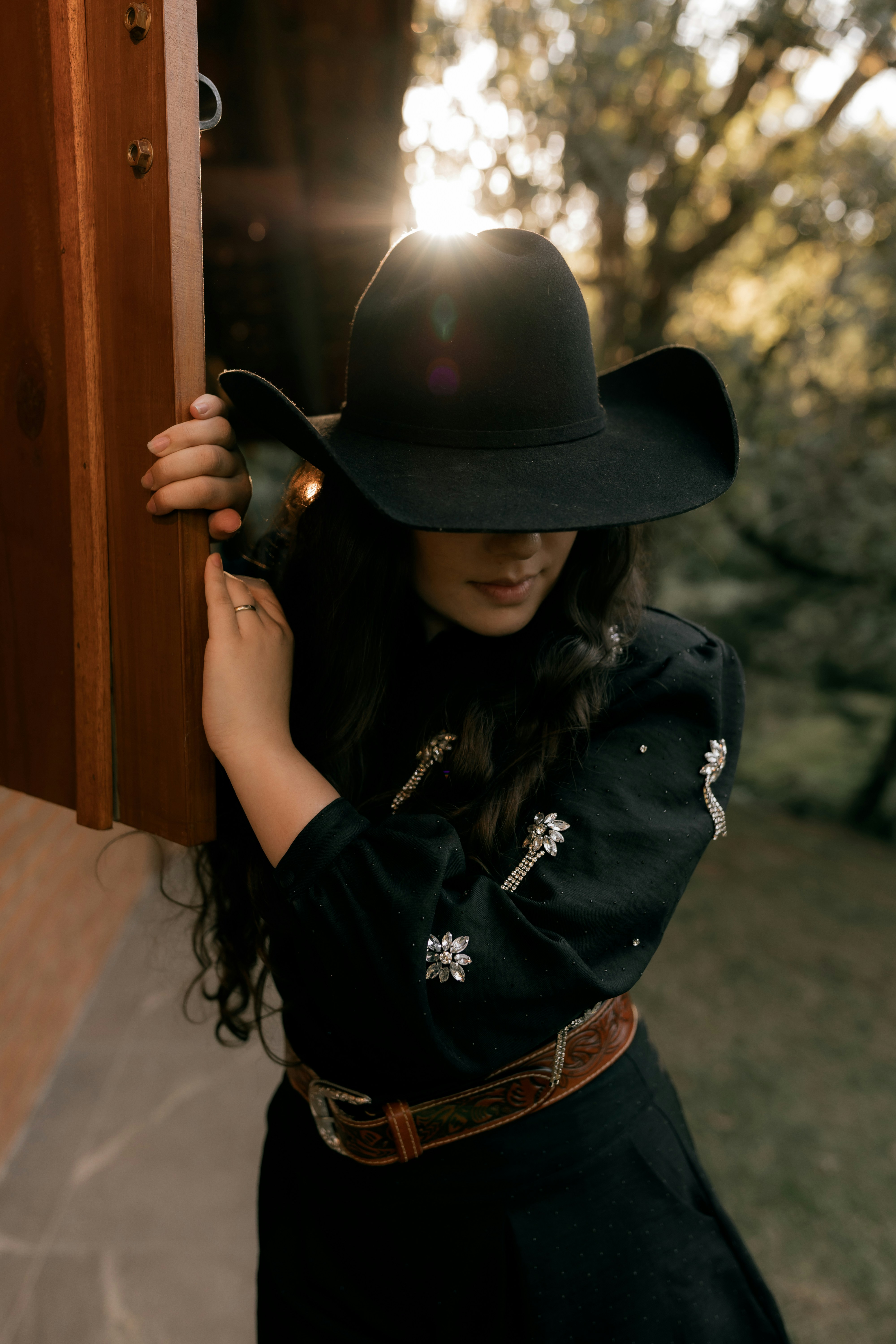 Sunlit Quiet: A Cowboy Hat and Velvet Night