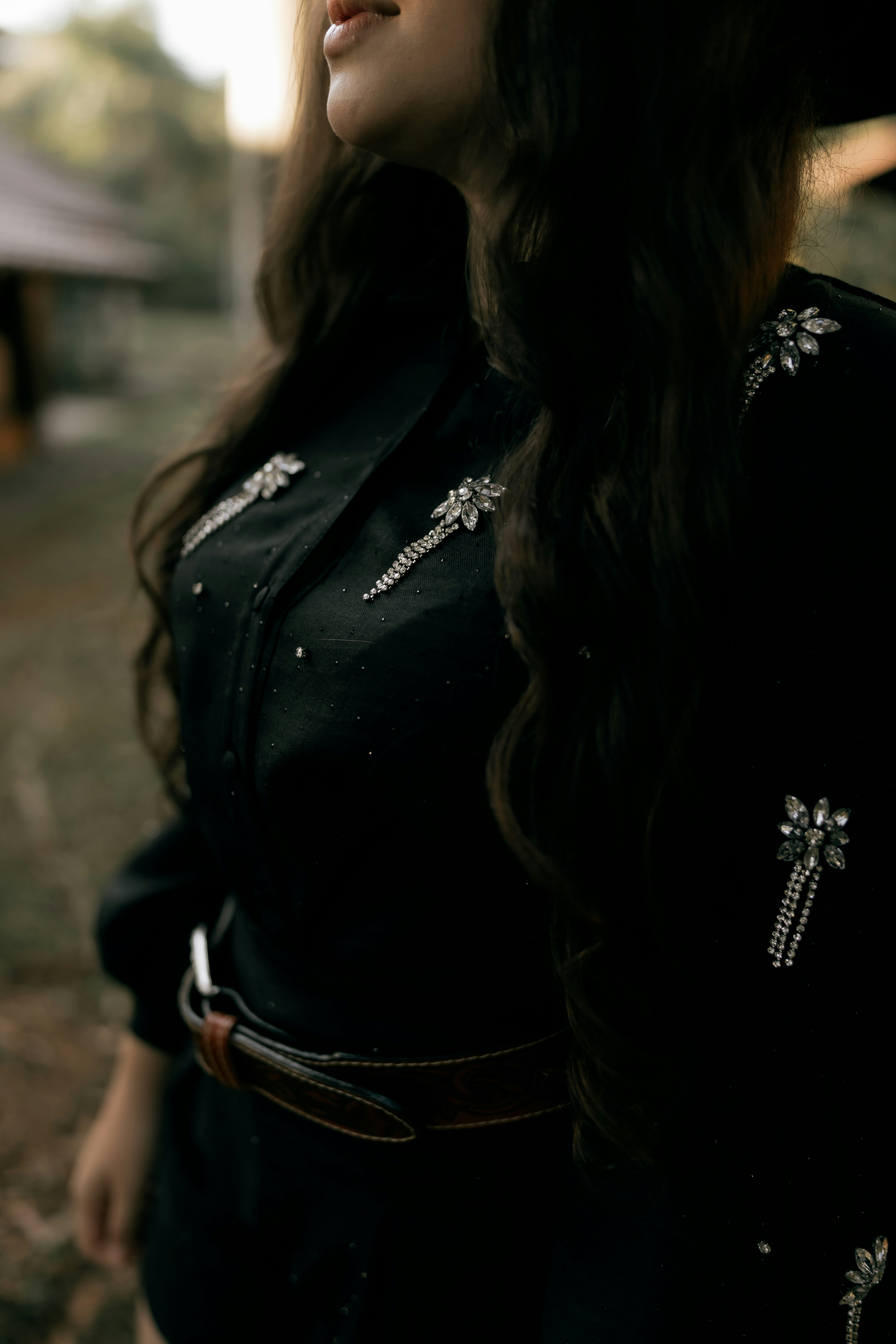 Embellished Black Shirt: Subtle Glamour in Evening Light
