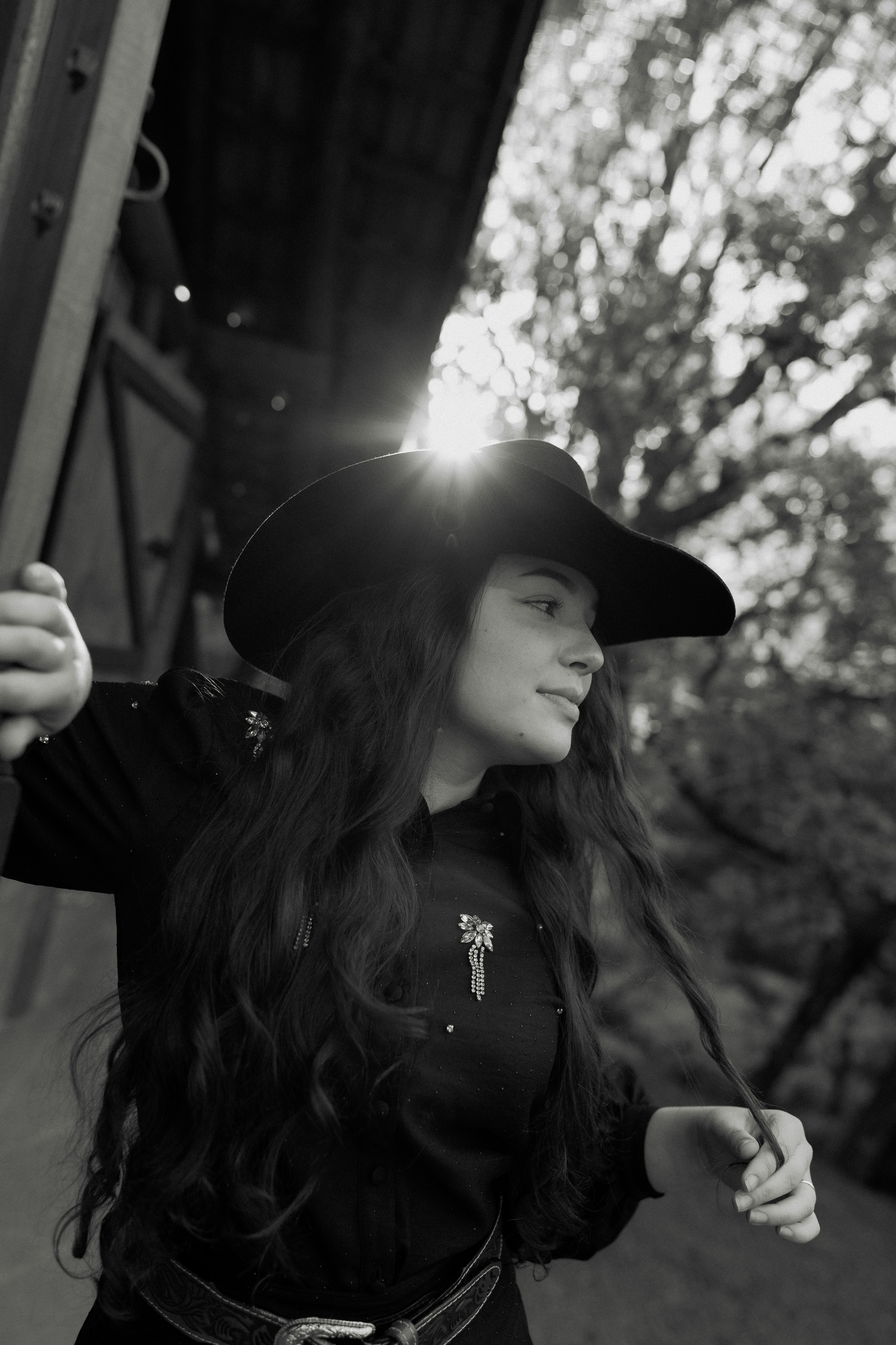 Sunlit Halo: A Portrait in a Cowboy Hat