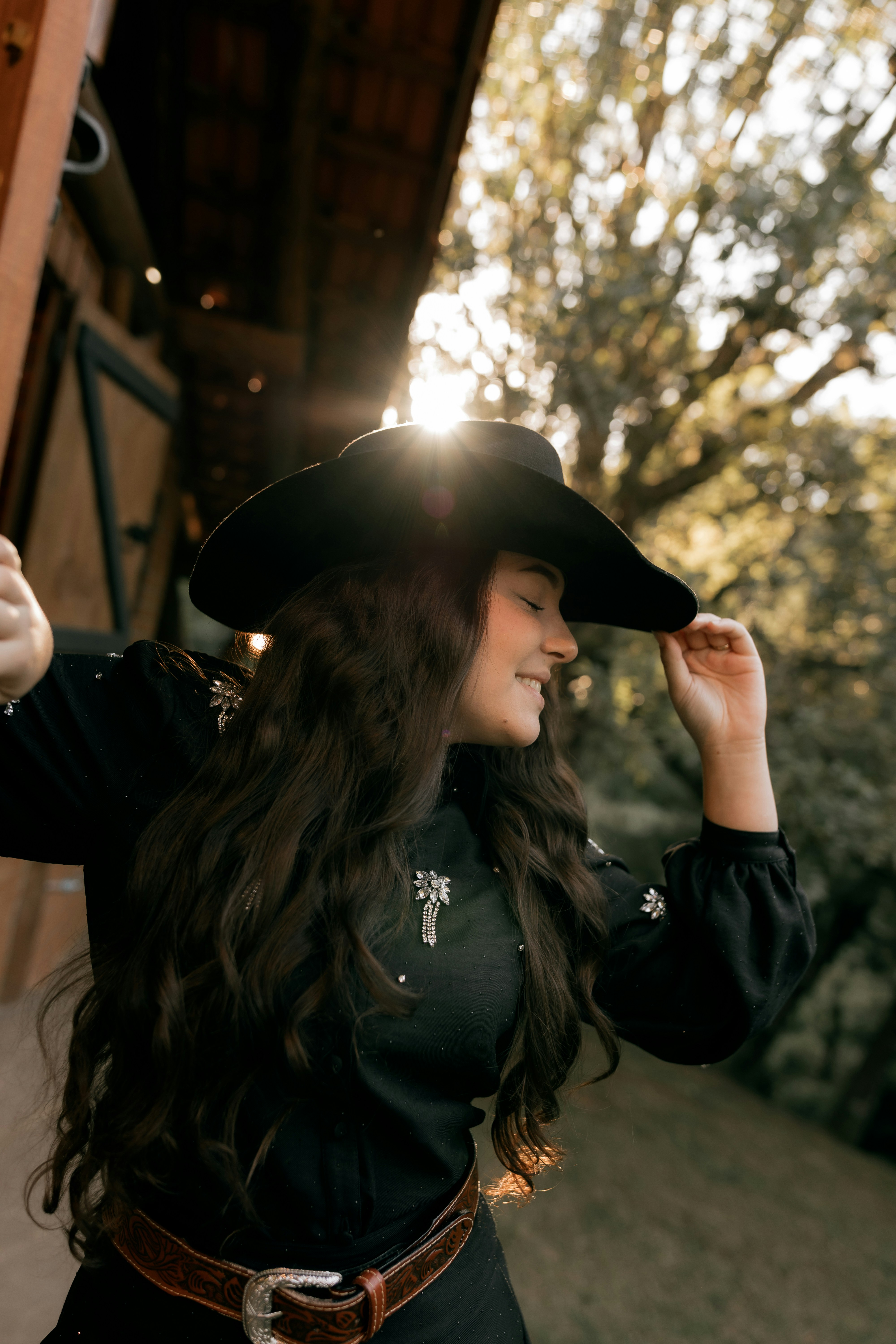 Sunlit Velvet: A Portrait of Confidence in a Wide Brim