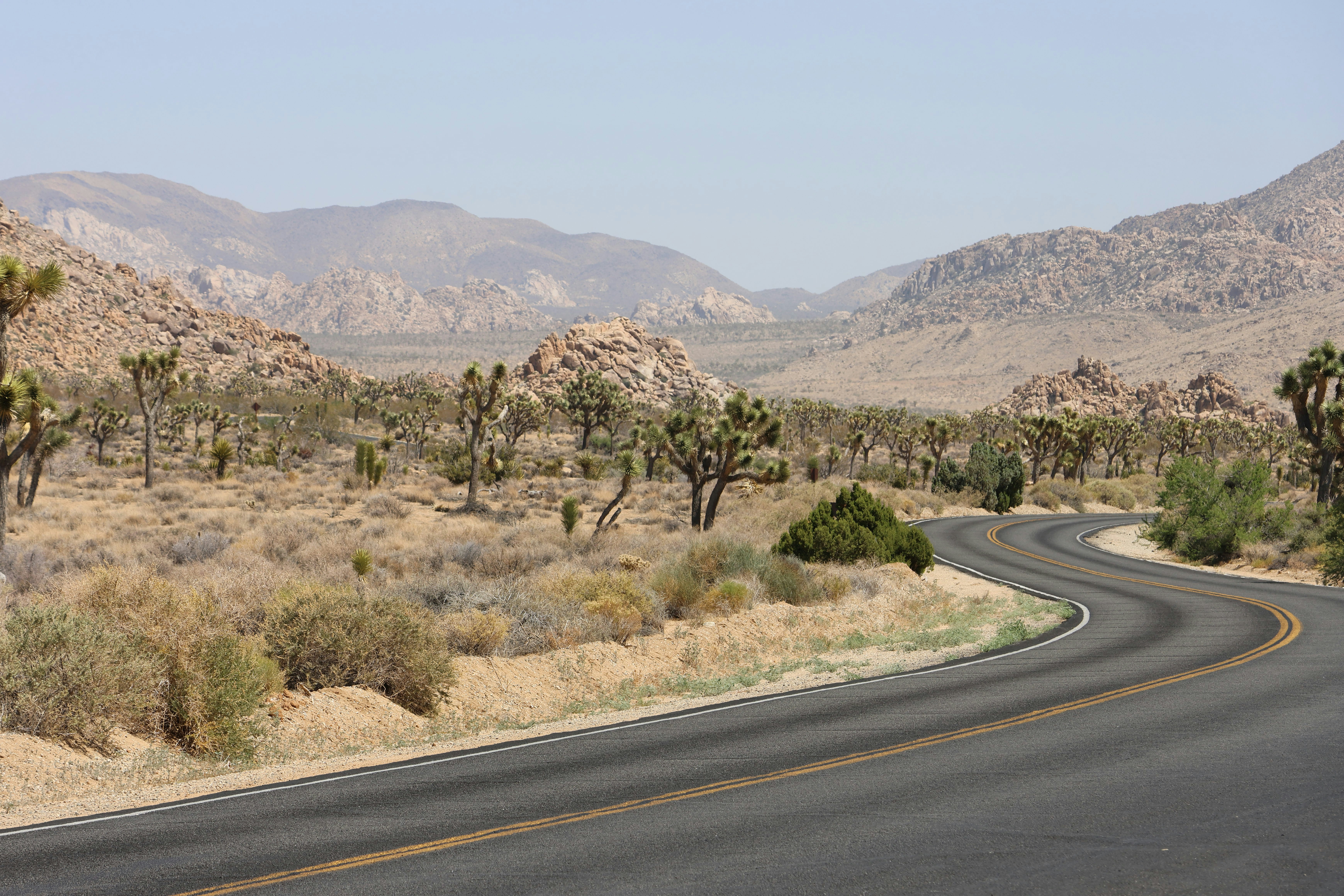 Desert Highway Curl Through Granite Hills