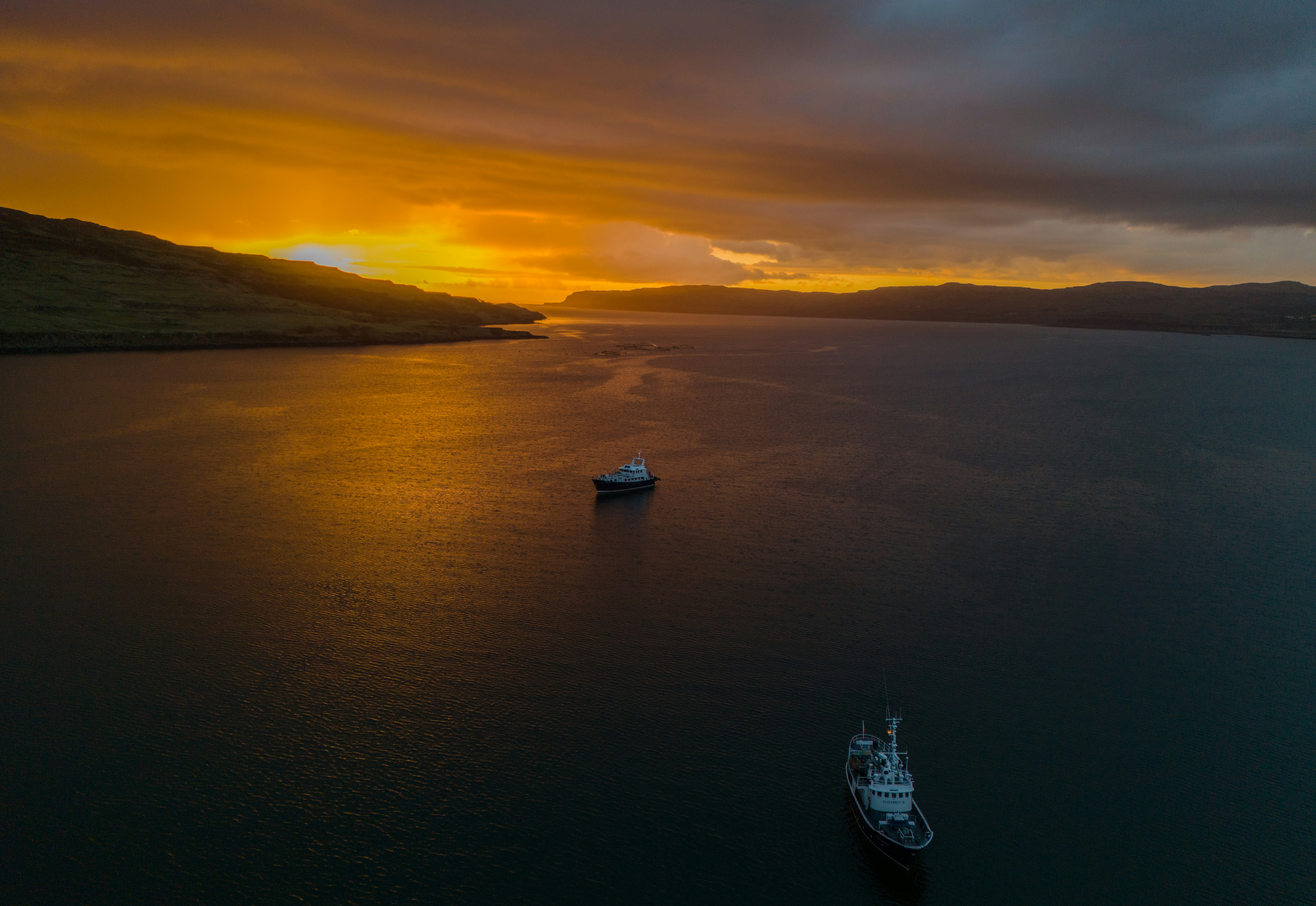Sunlit Sea Gate: A Horizon Boat Standing Between Fire and Calm