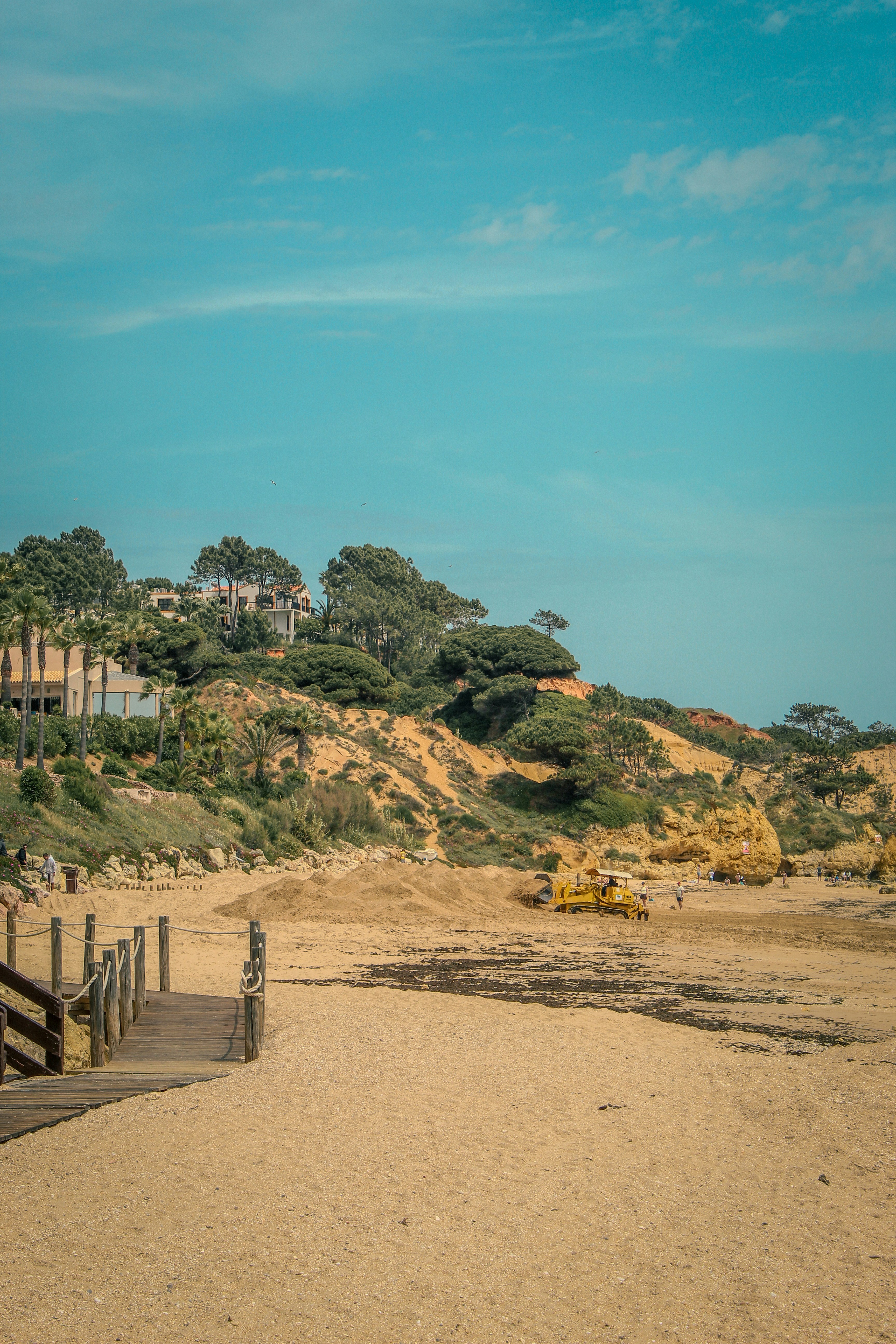 Clifftop Village Overlook Beneath a Clear Coastal Sky