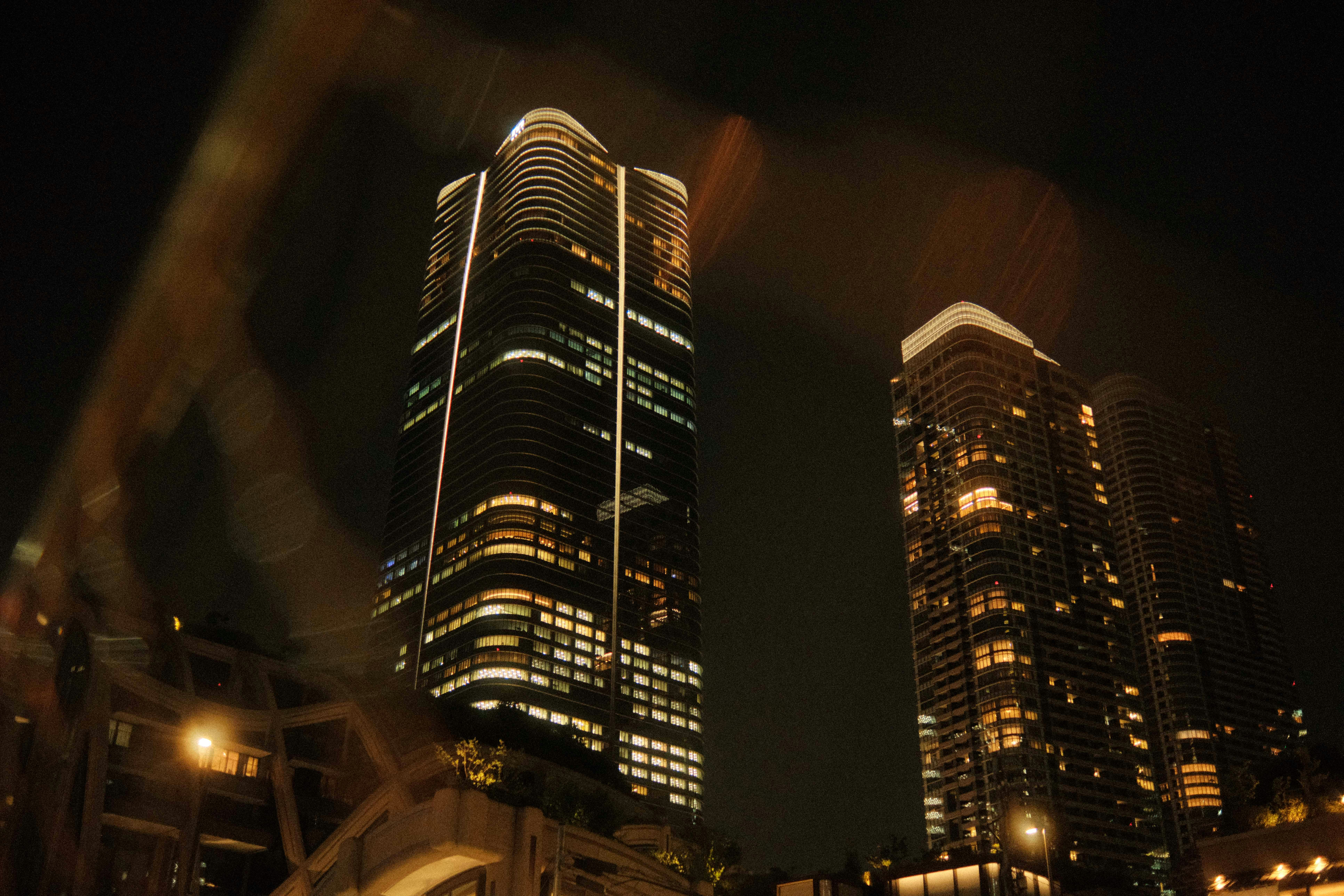 Night Towers: Neon Glow Between Towers