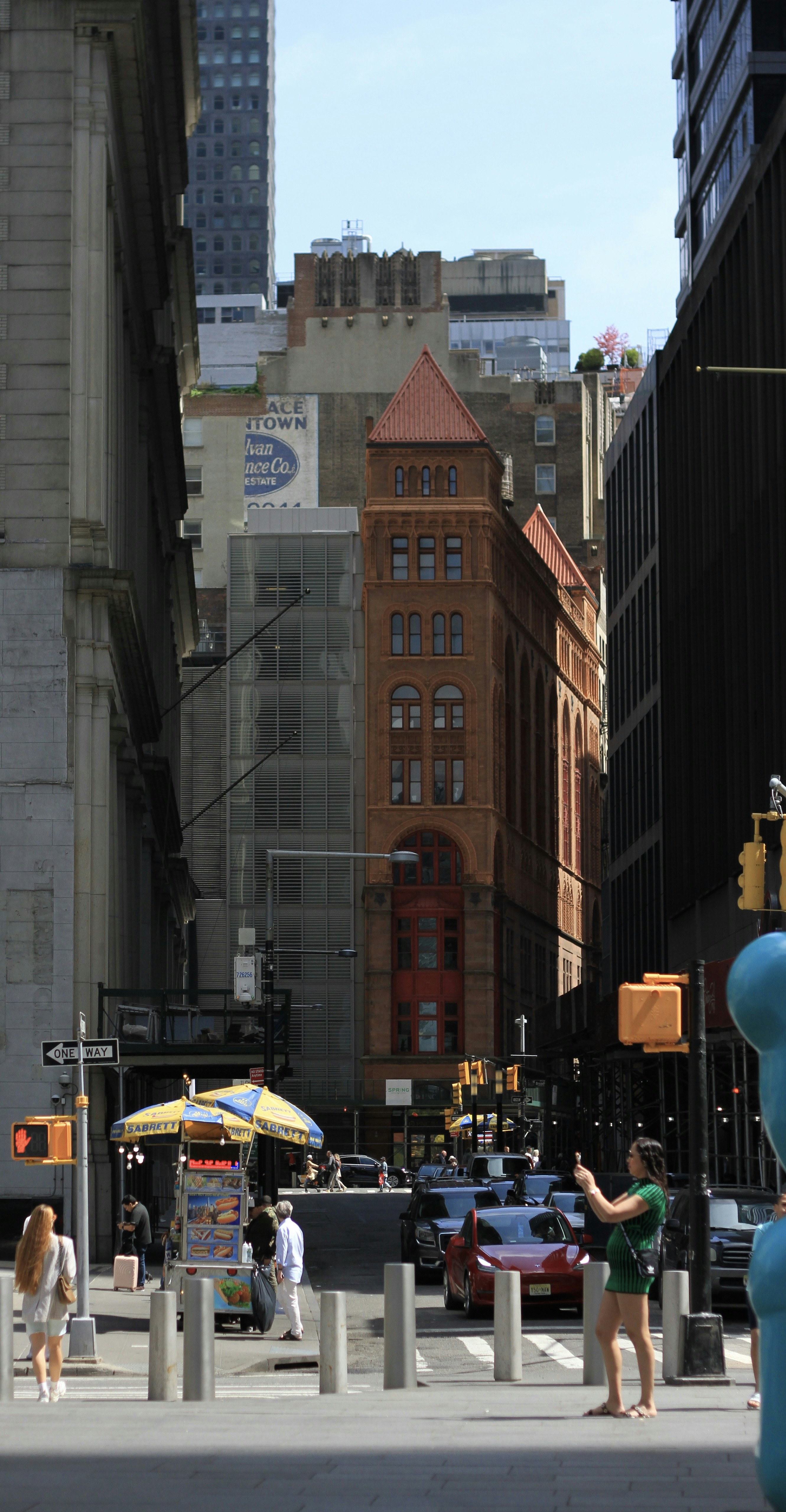 City of Brick and Steel: Red-Gabled Tower in a Bustling Midtown