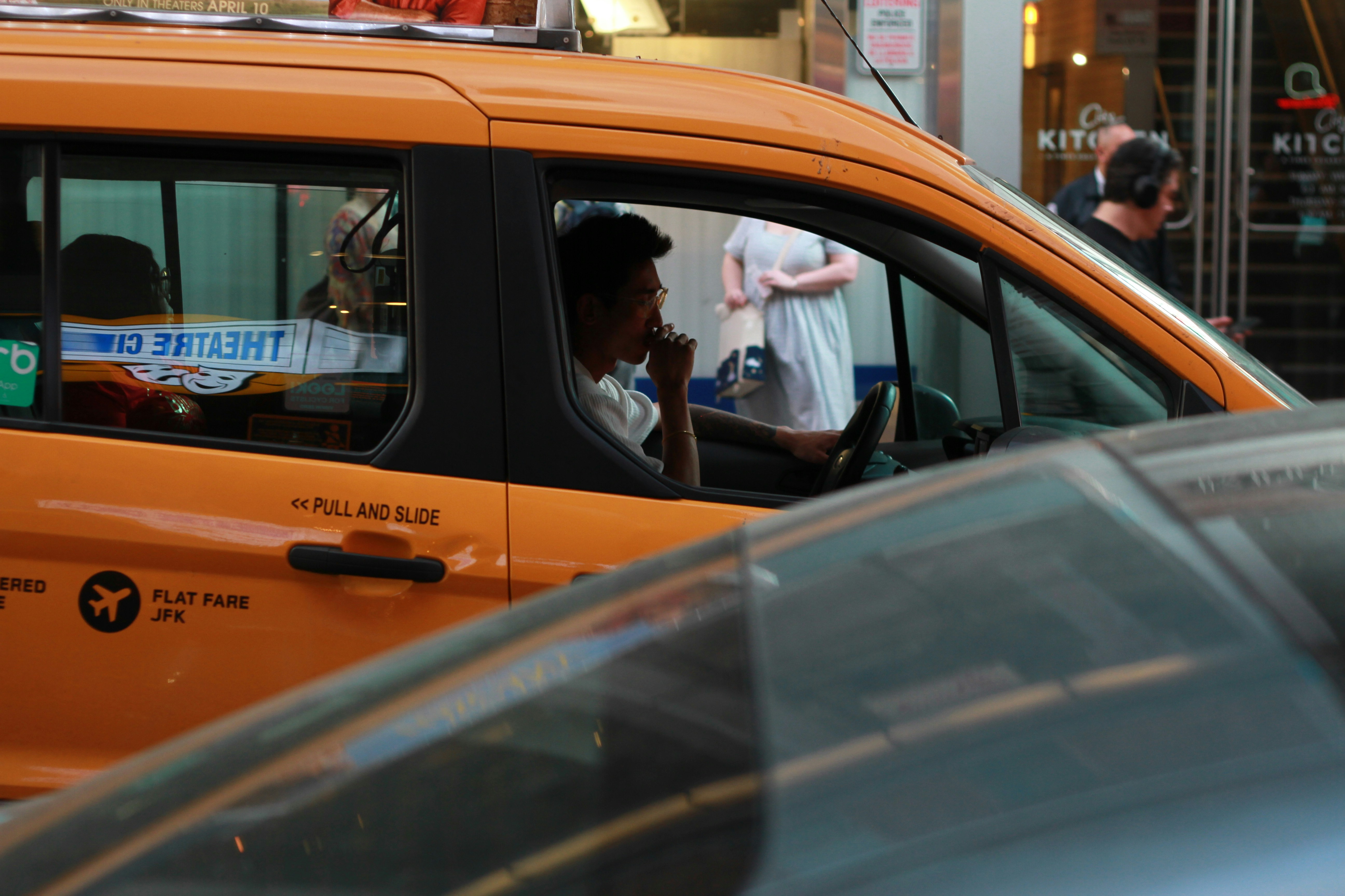 Inside the City Cab: A Passenger in Focus