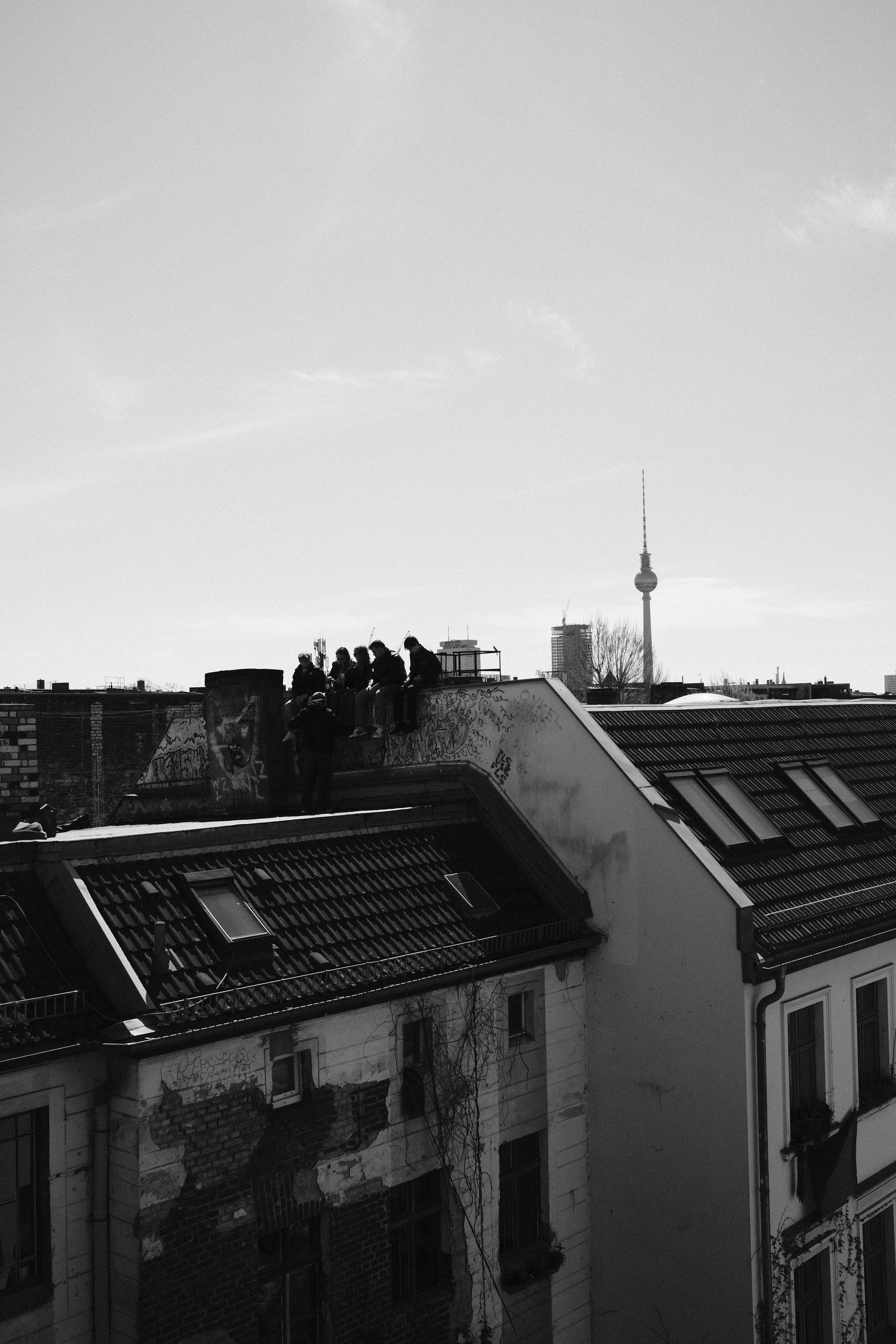 Rooftop Assembly under a Quiet City Skyline
