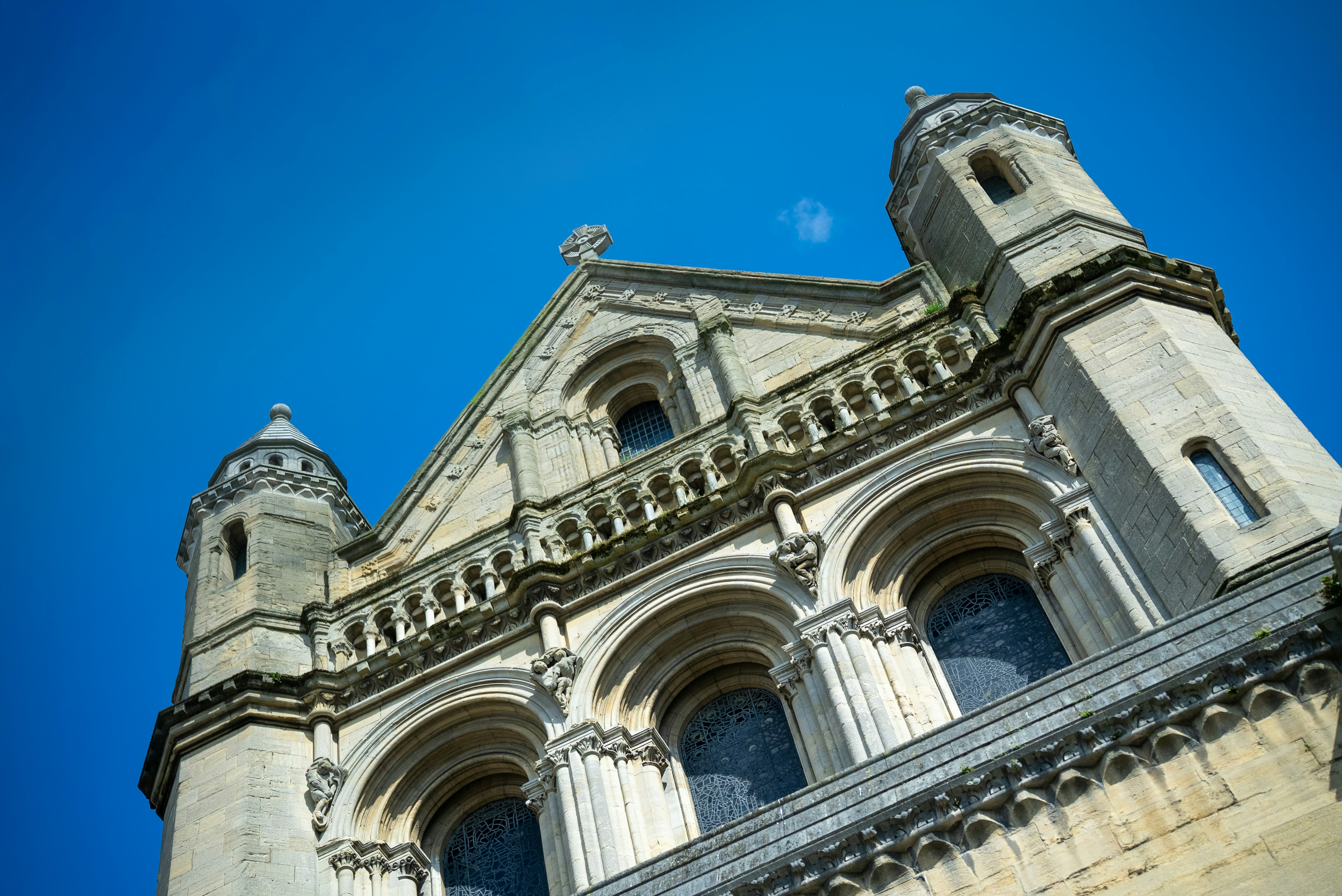 Stone Cathedral Facade Reaching Toward a Clear Sky