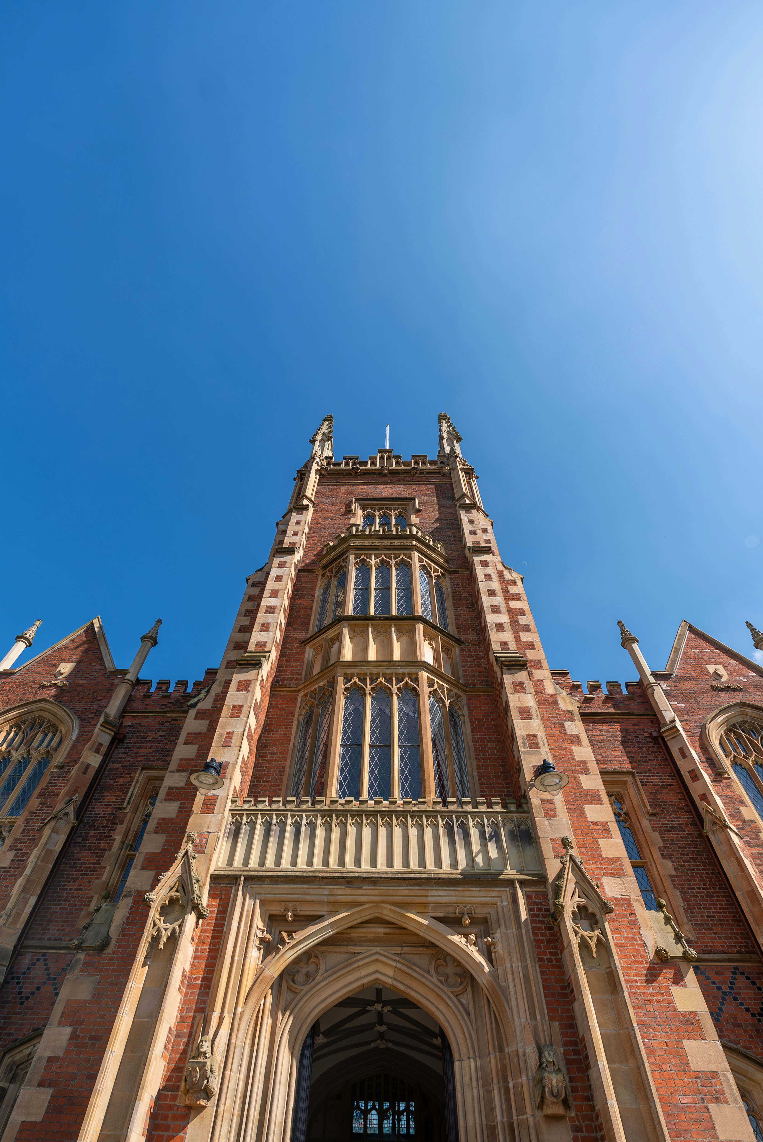 Gothic Gateways: A Brick Cathedral Reaching Toward the Sky