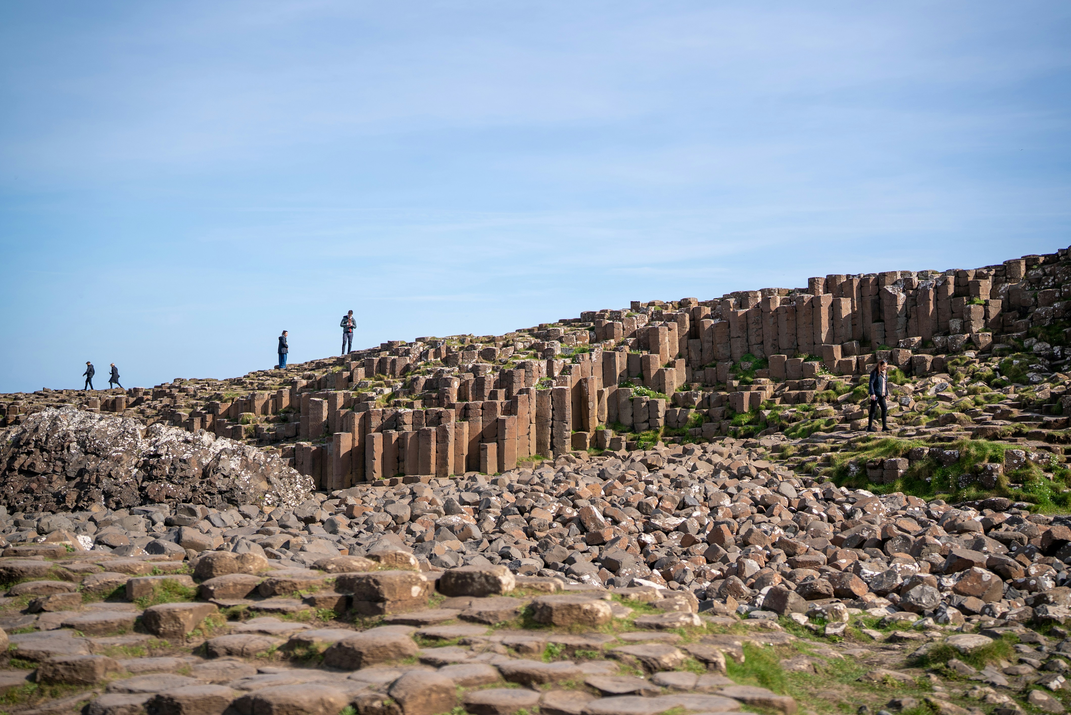 Steps of Basalt: Figures Among the Giant Columns