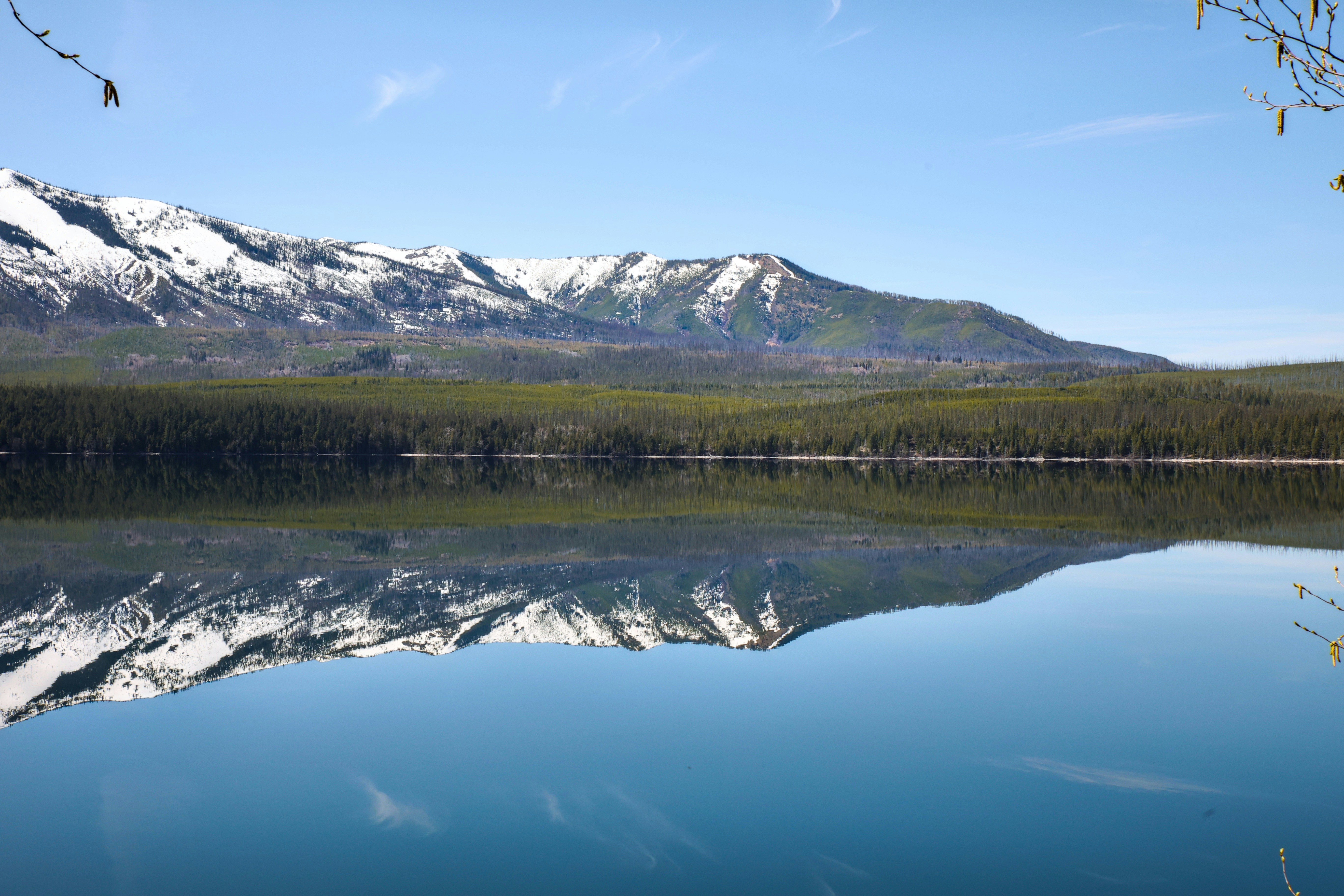 Mirror Peak: Snow-Capped Ridge Reflected on Velvet Lake