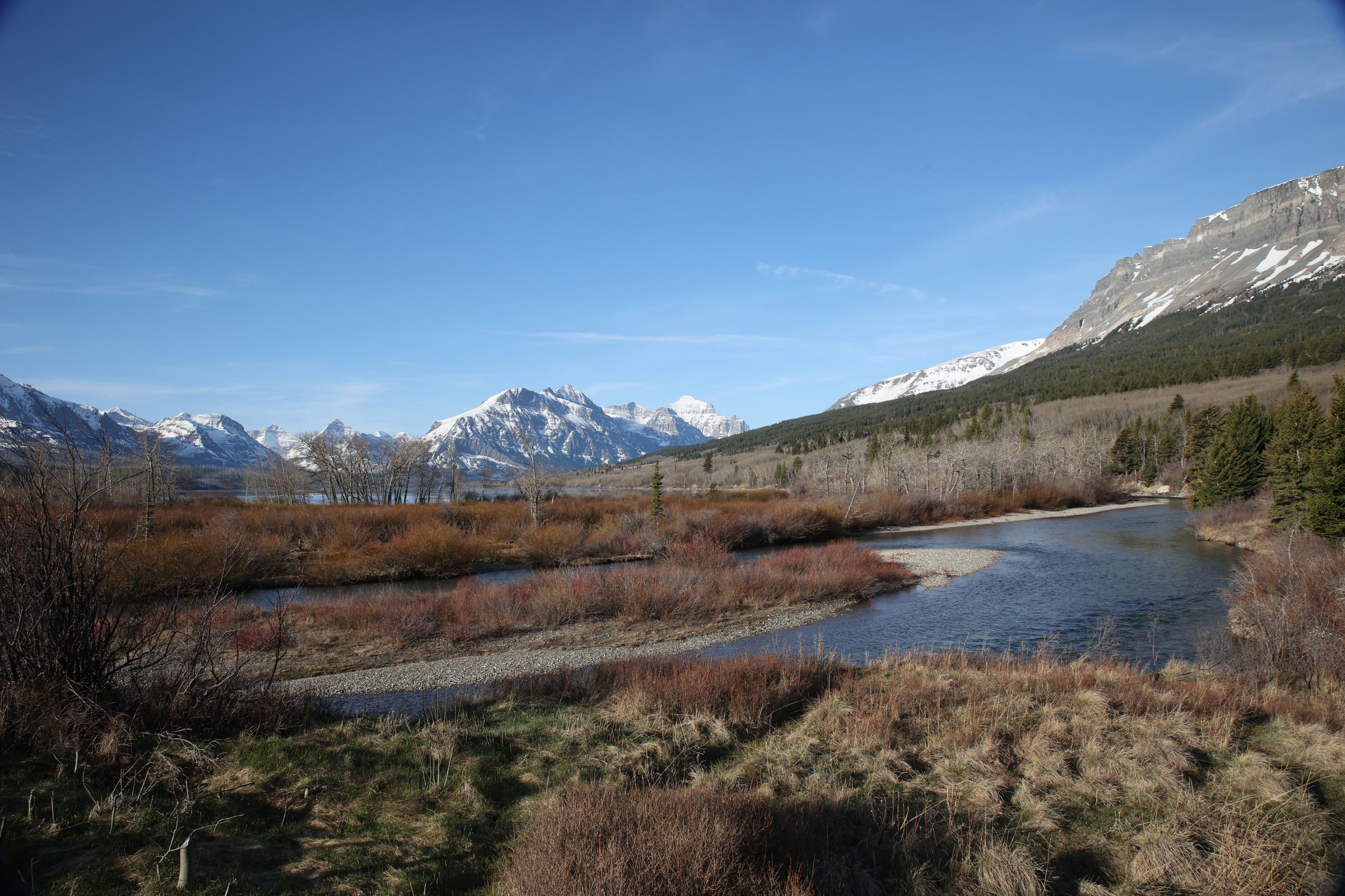 River Bend under Snow‑capped Peaks