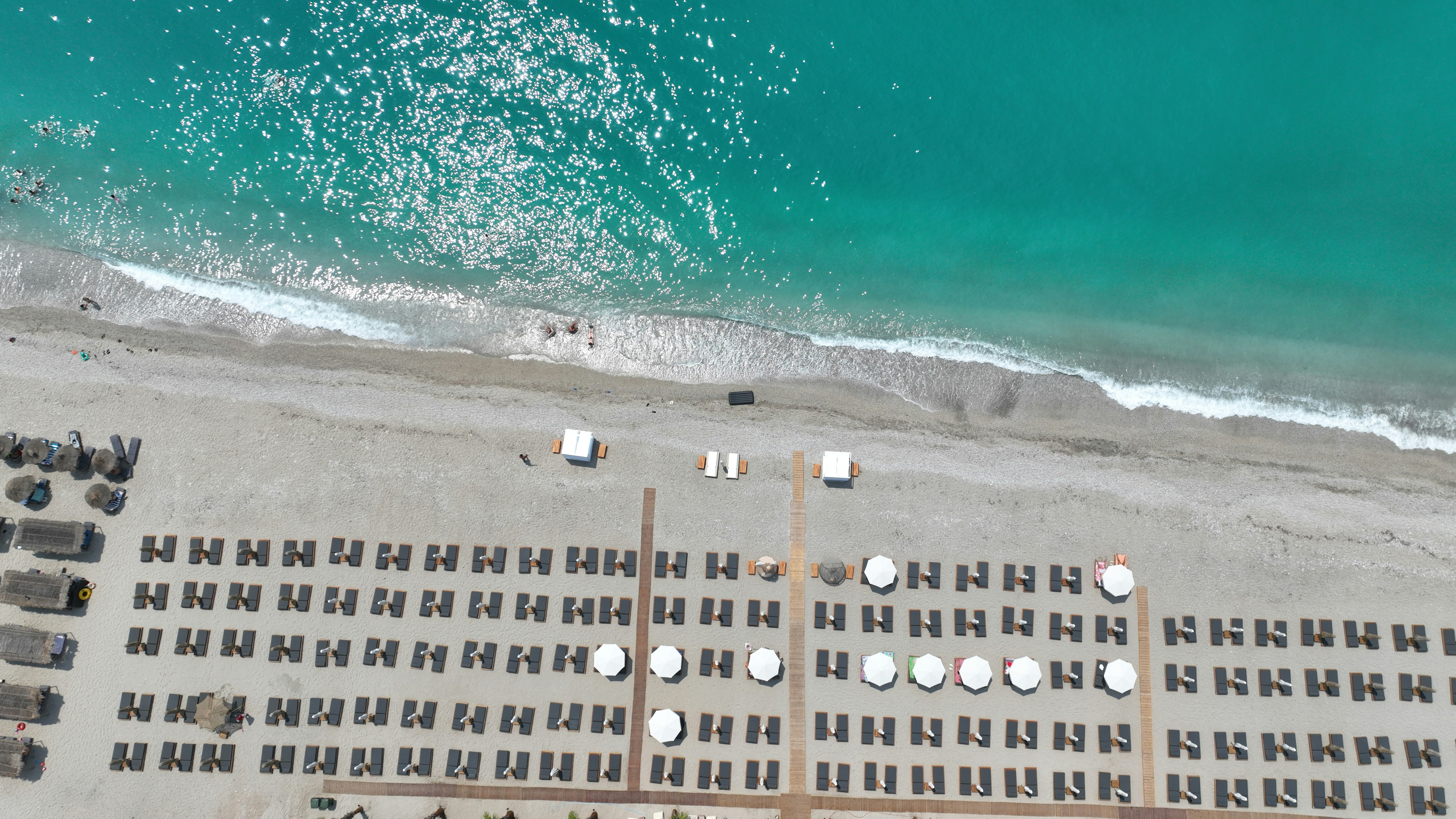 Granular Grid: Aerial Beach Chair Arrangement by the Shore