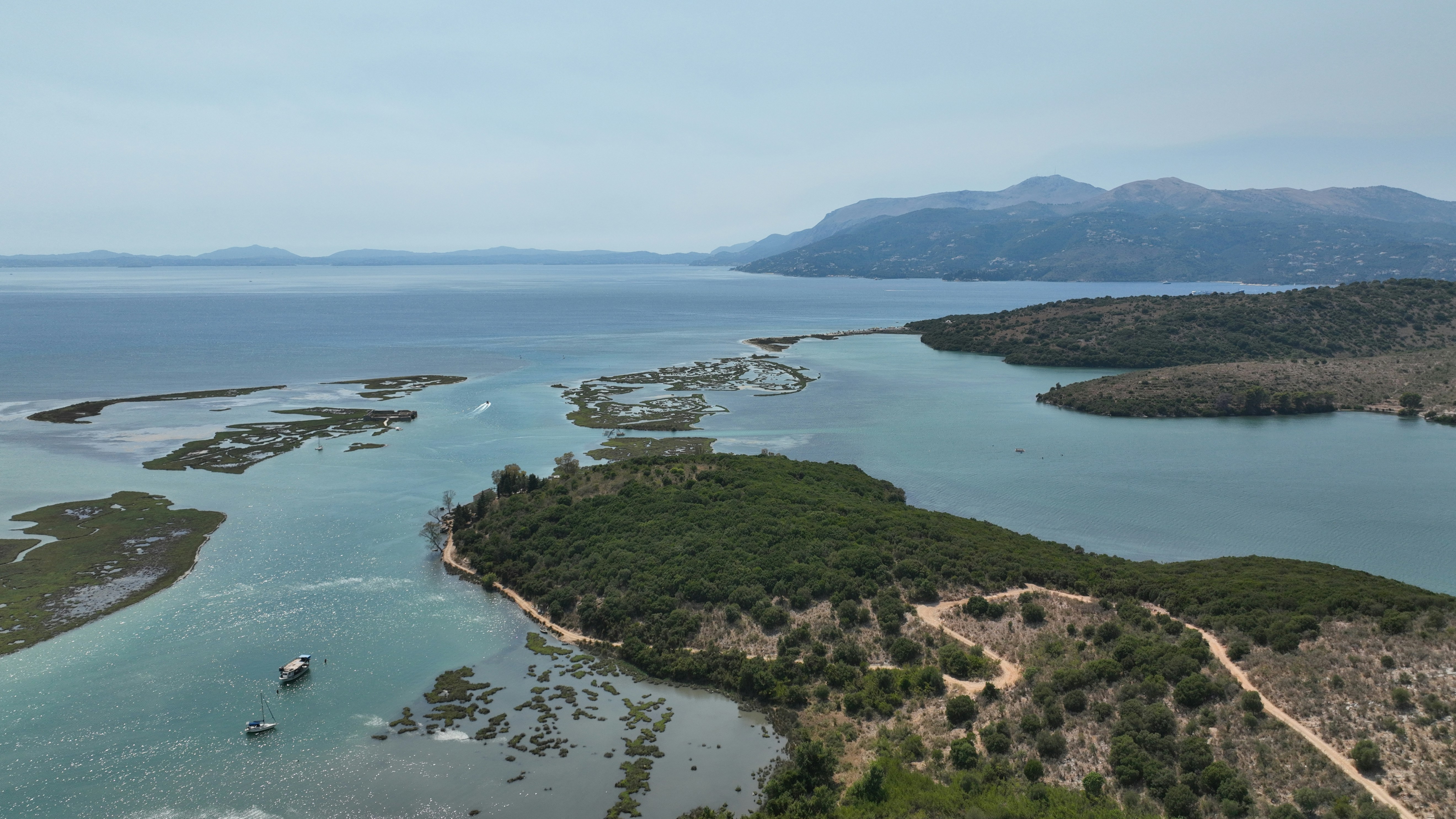 Coastal Inlet: A Quiet Convergence of Sea, Island, and Trail