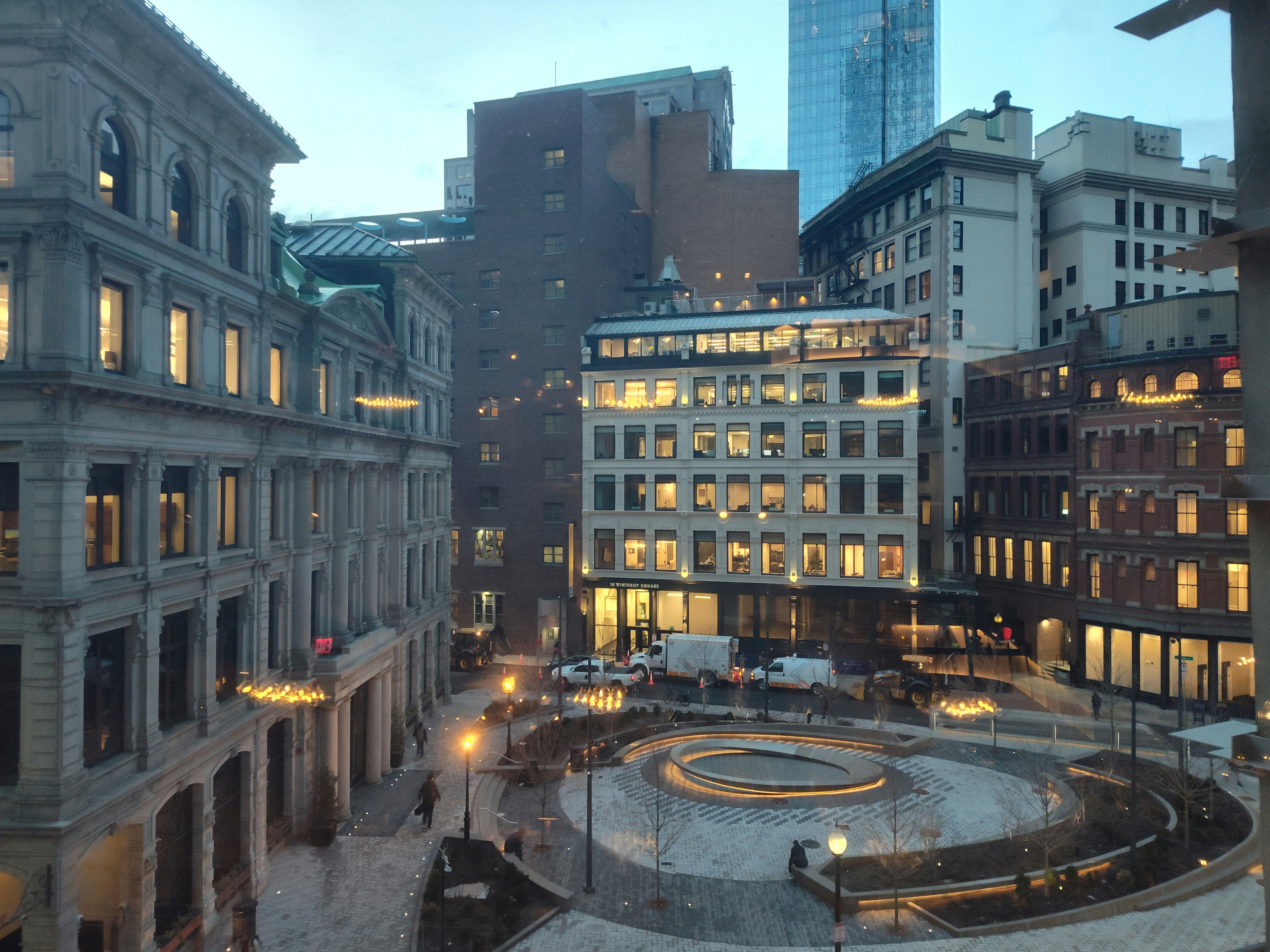 Evening Awash in Lamp Light Over a Historic Plaza