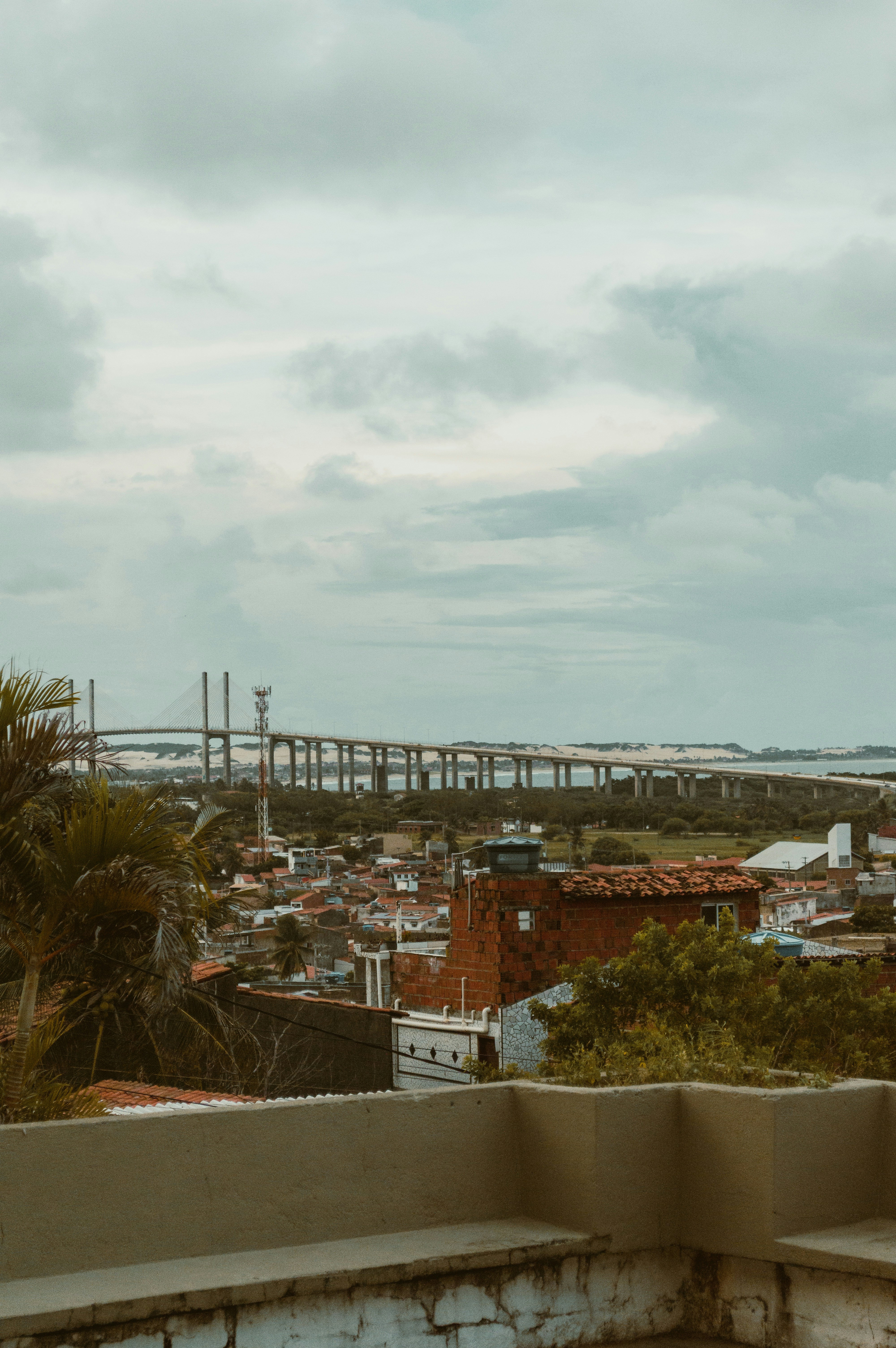 Horizons over Brick and Iron: A City Rooftop Lookout at Dusk