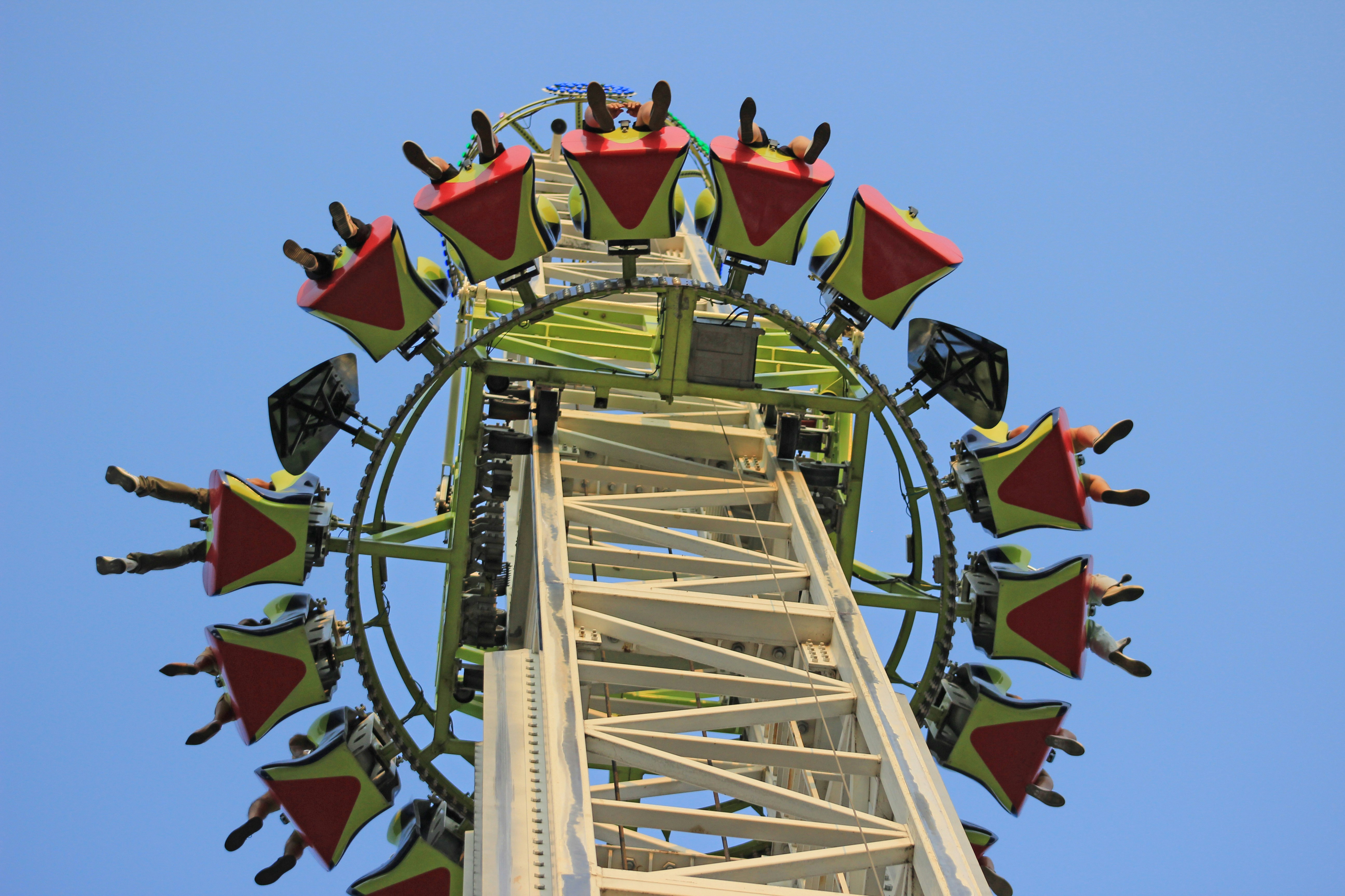 Circling under a clear blue sky: the Ferris wheel’s central hub