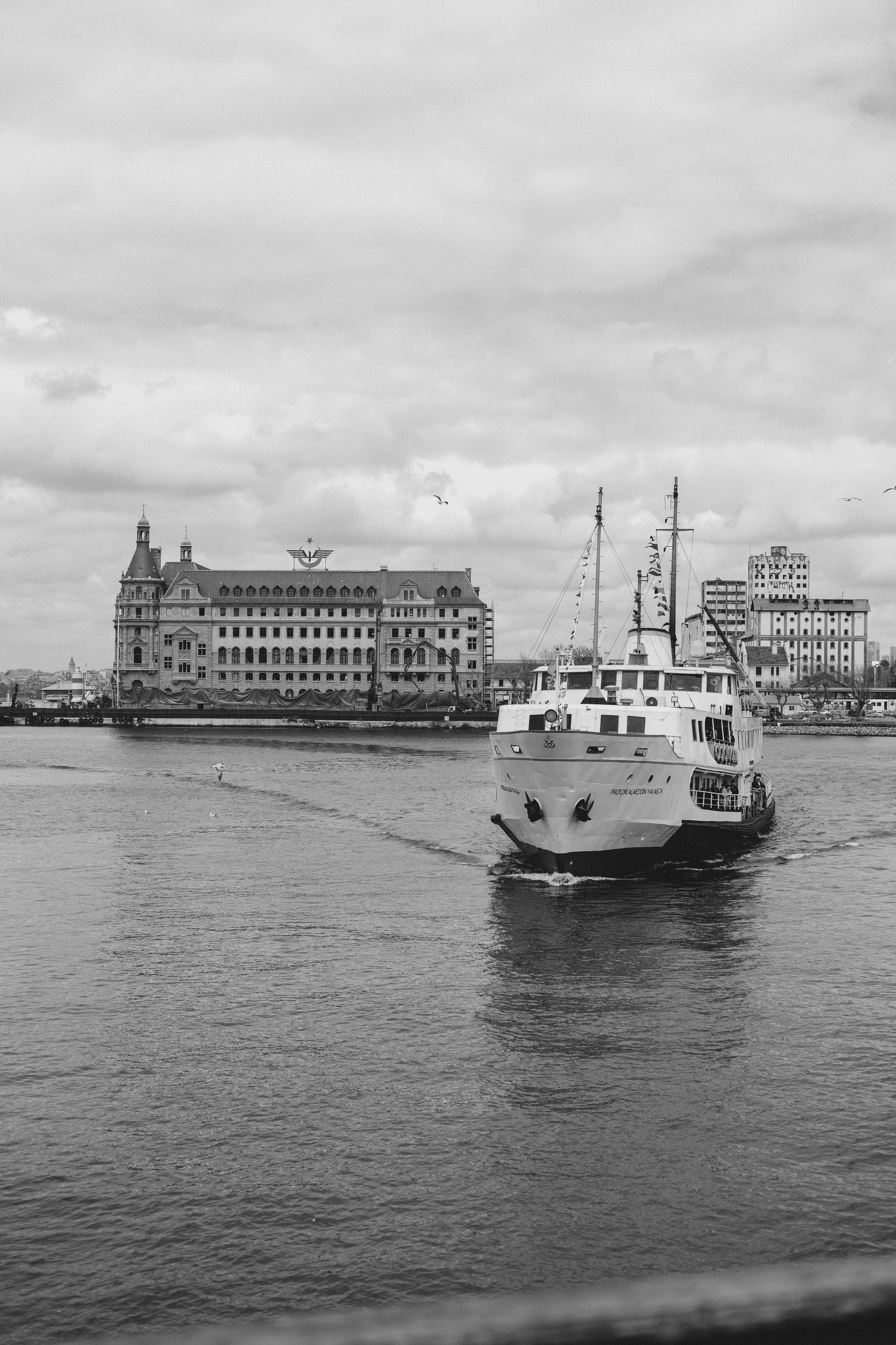 Harbor Bound: The Passenger Vessel Navigates a Quiet City Wake