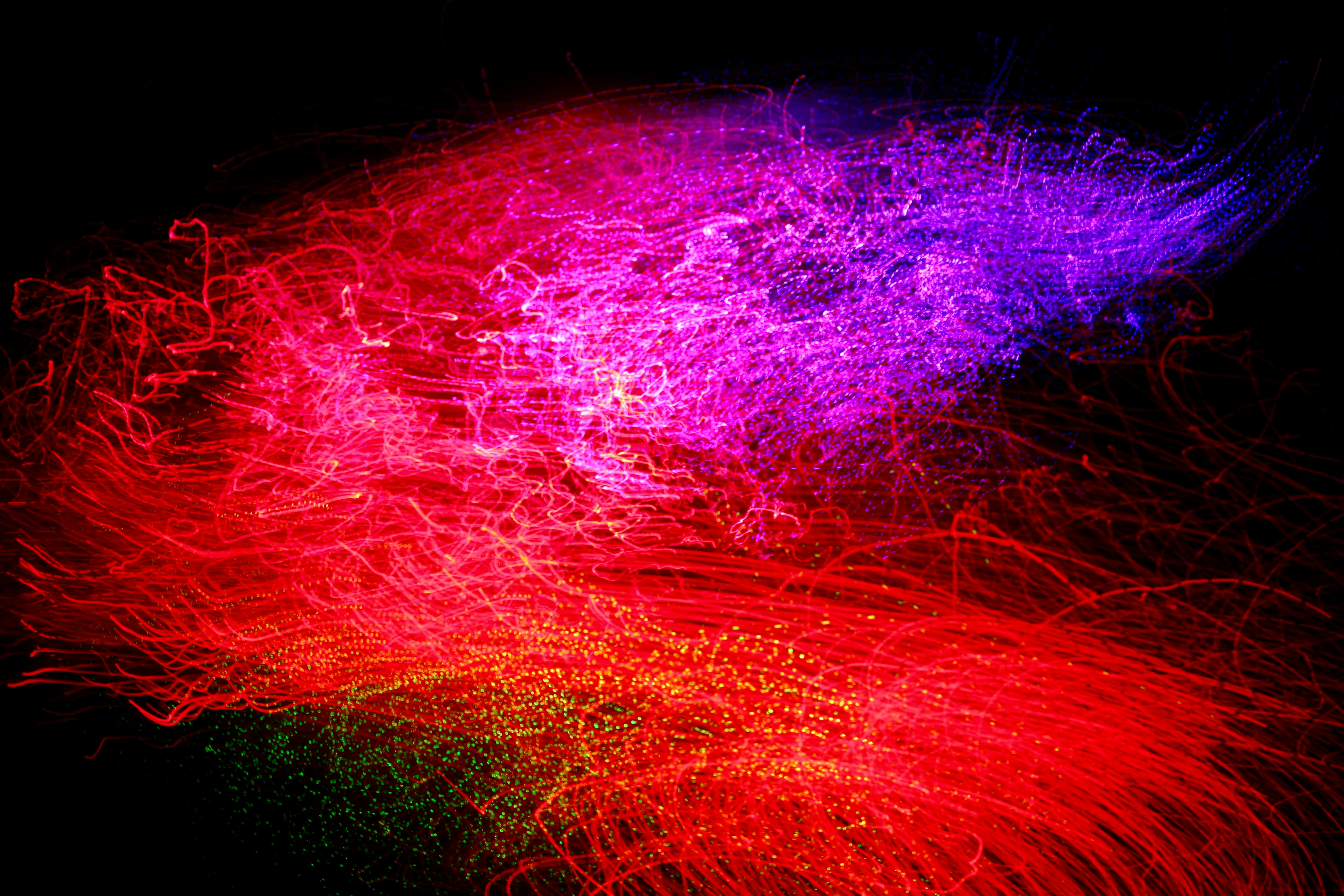 Aurora of Motion: Neon Tracers in the Dark