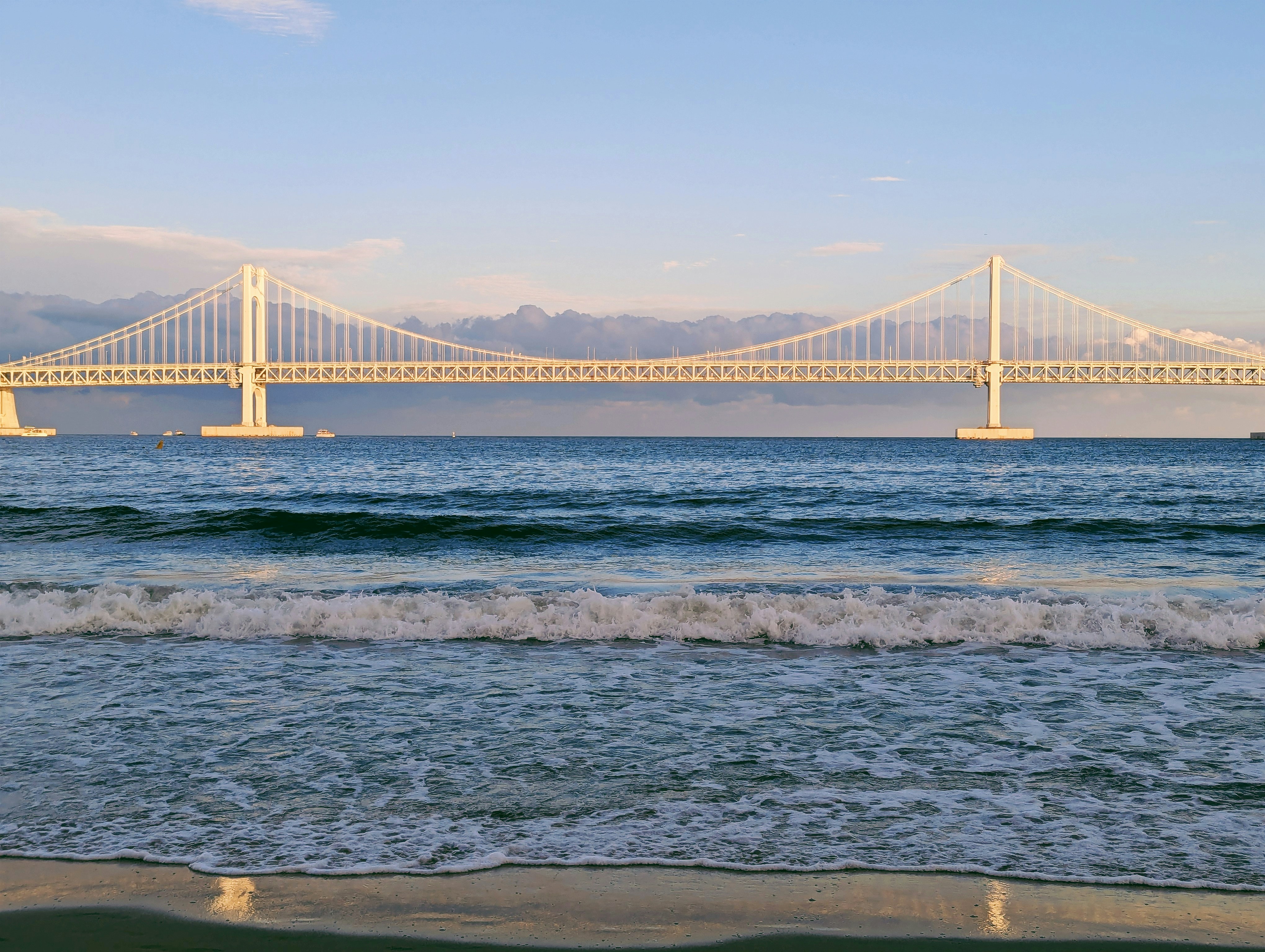 Bridge over Blue Quiet: A Coastal Dawn