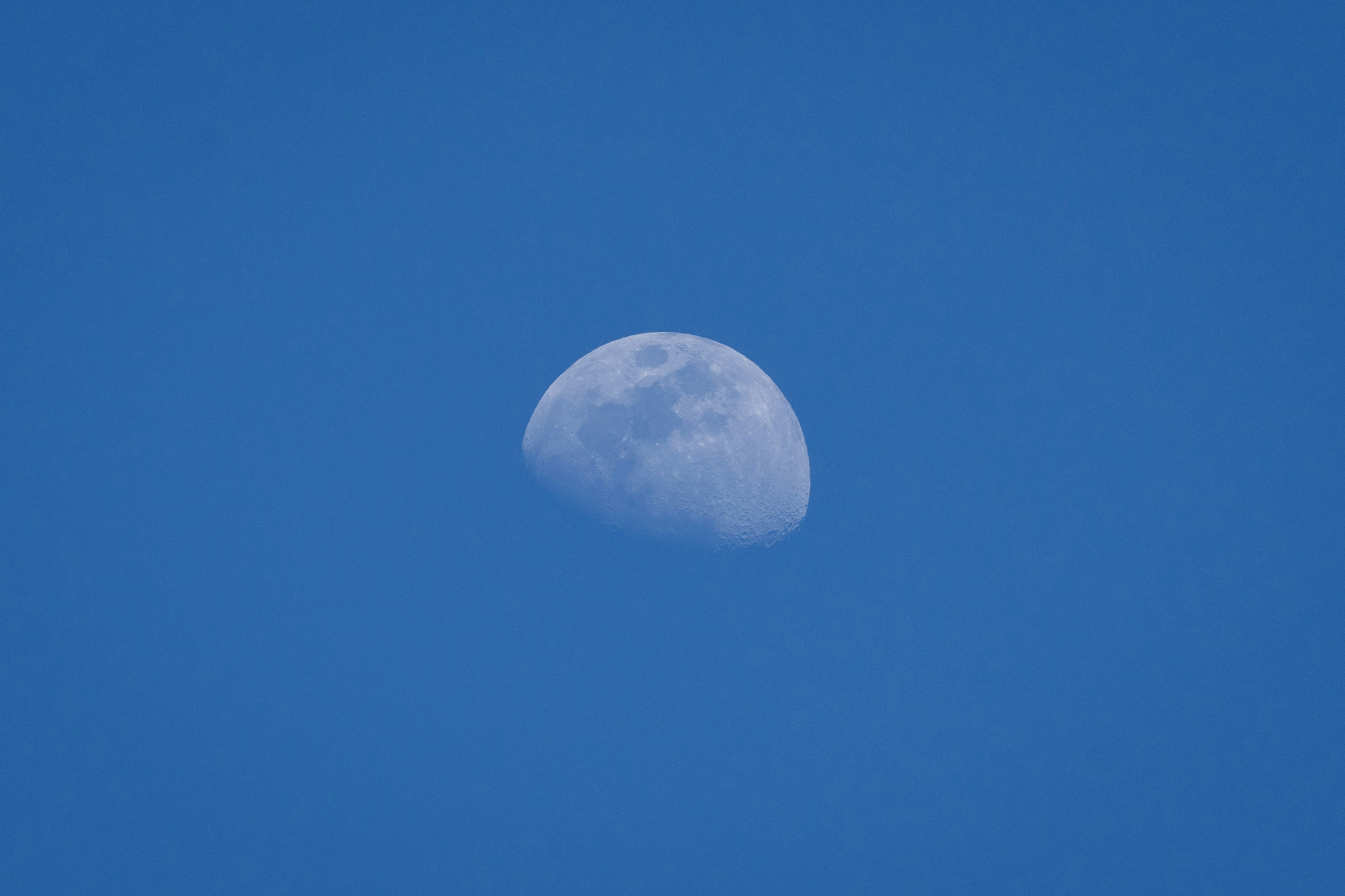 Moon in the Ultramarine: a Quiet Moment in Wide Sky