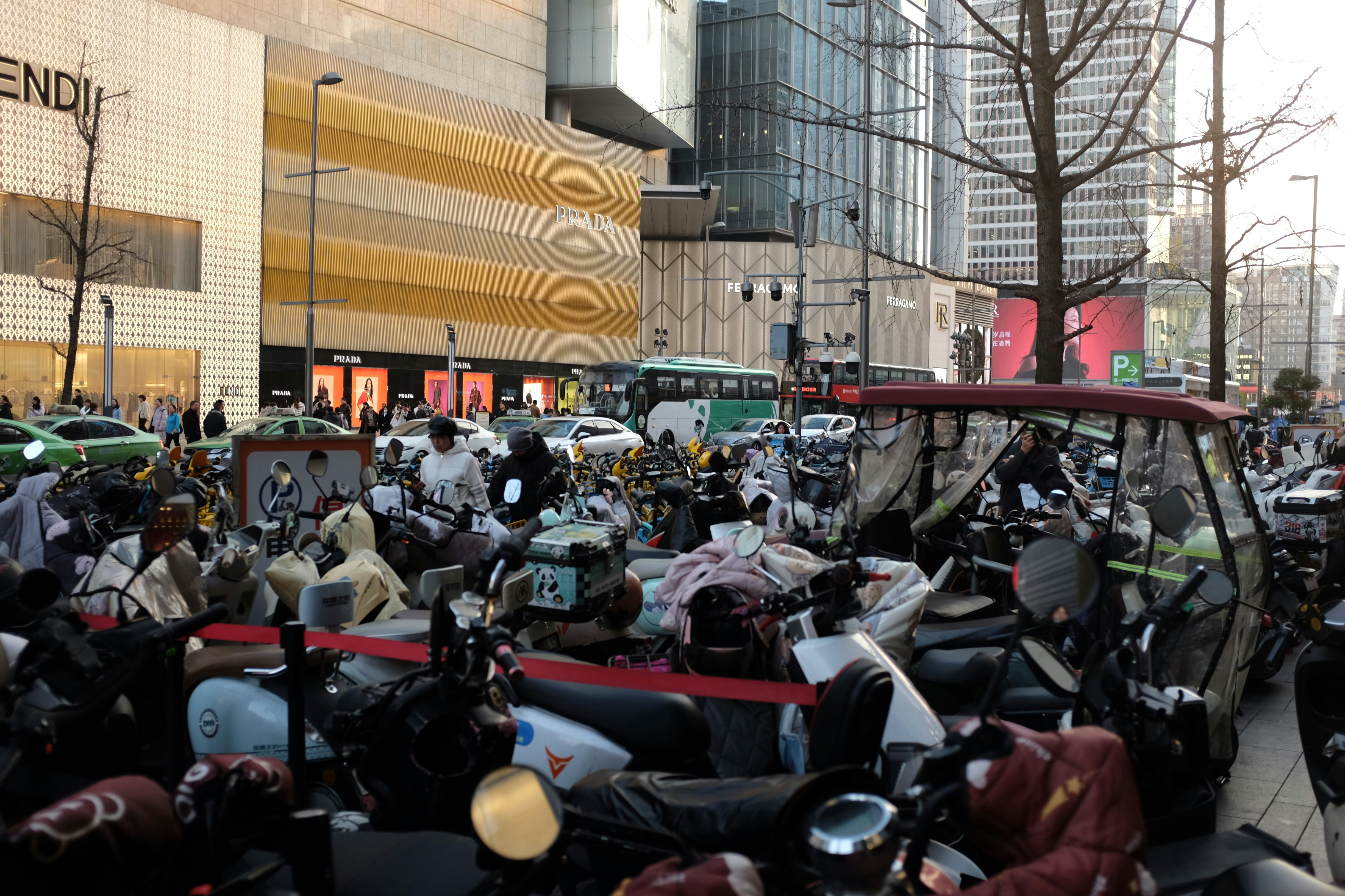 City Pulse: Sea of Motorbikes at a Bustling Shopping District