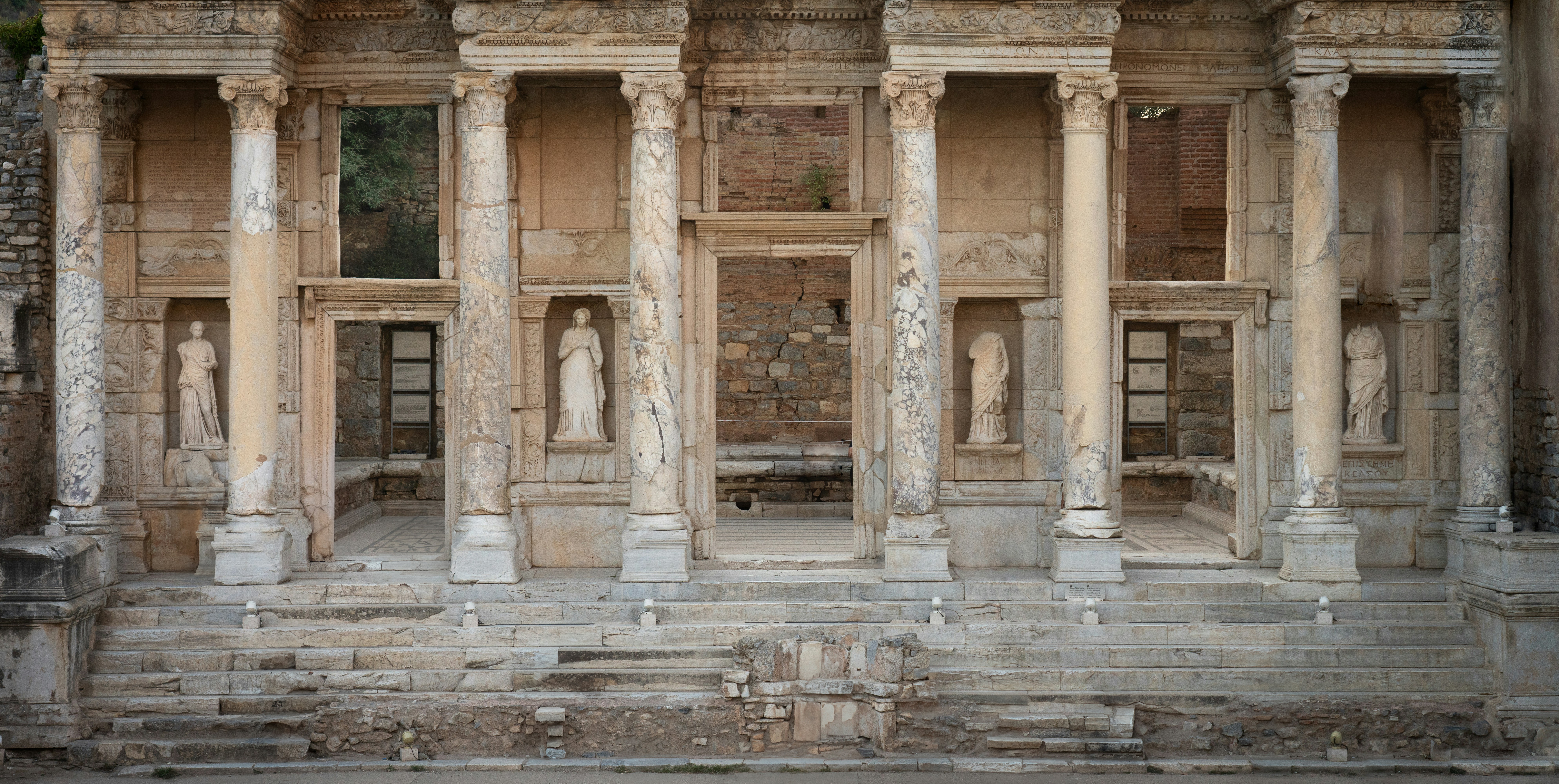 Stone Pillars and Echoes: Symmetry in an Ancient Arcade
