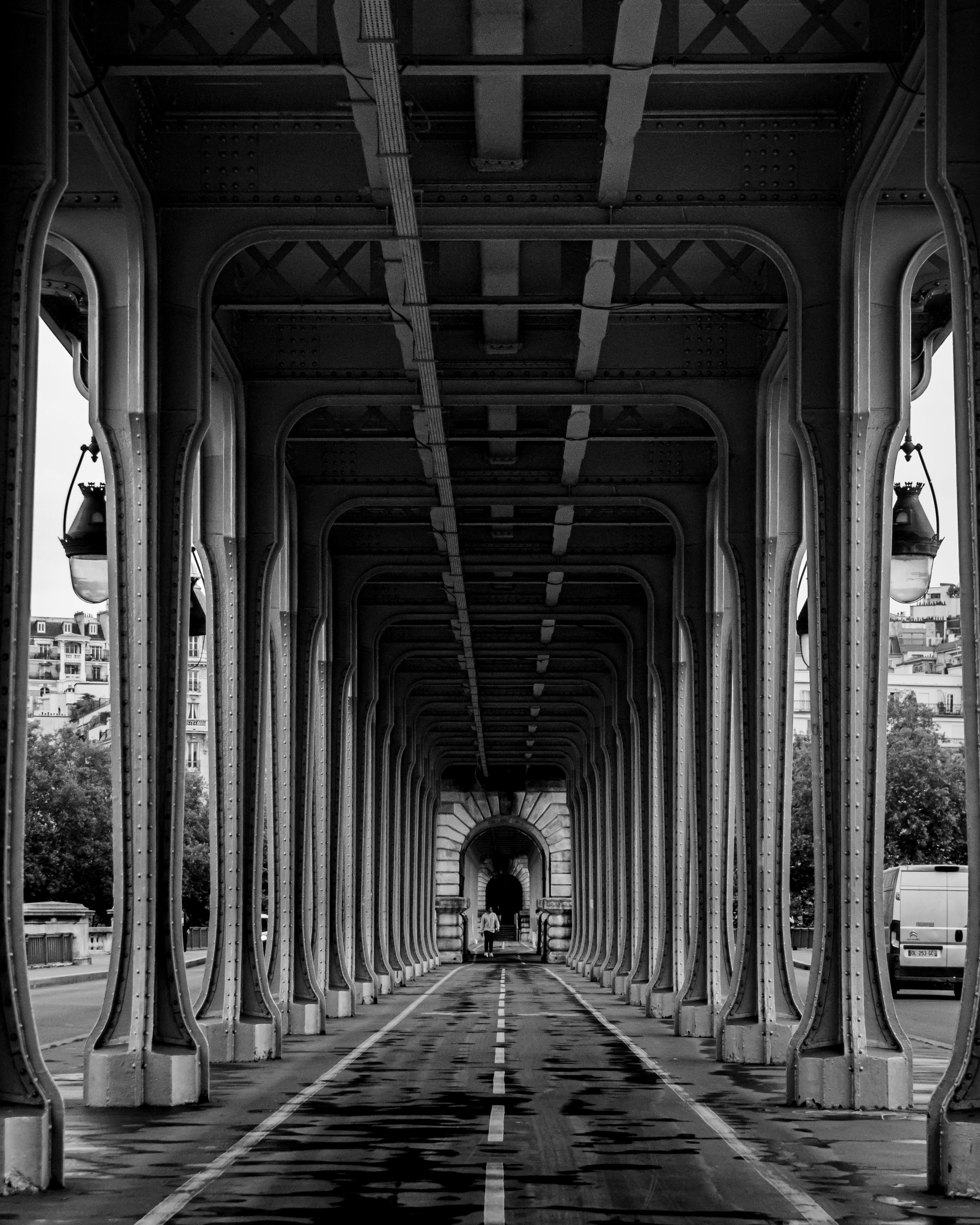 Symmetrical Archway: A Monochrome Journey Through the Transit Corridor