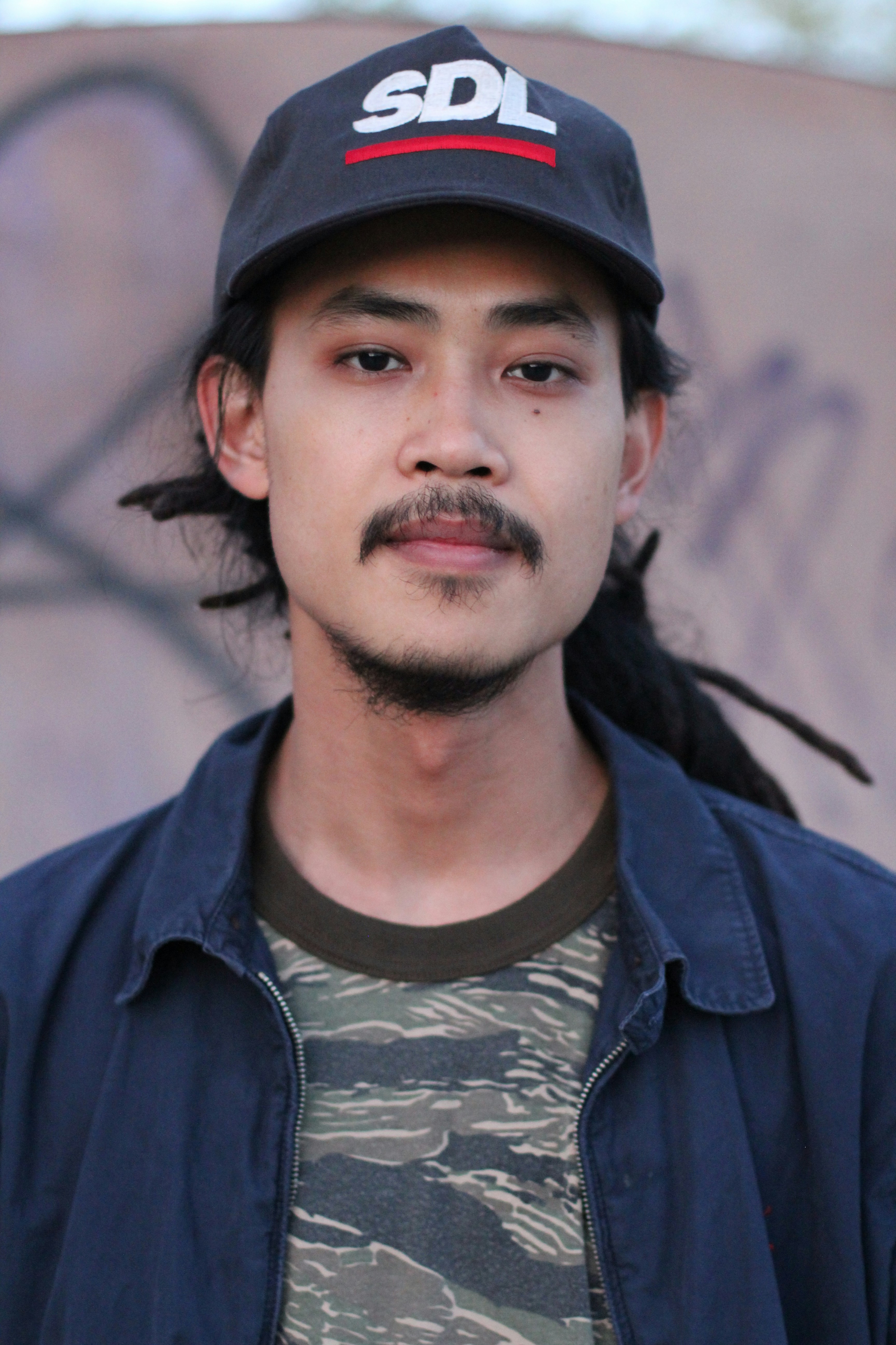 Centered Resolve: A Portrait in Soft Focus and Streetlight Hue