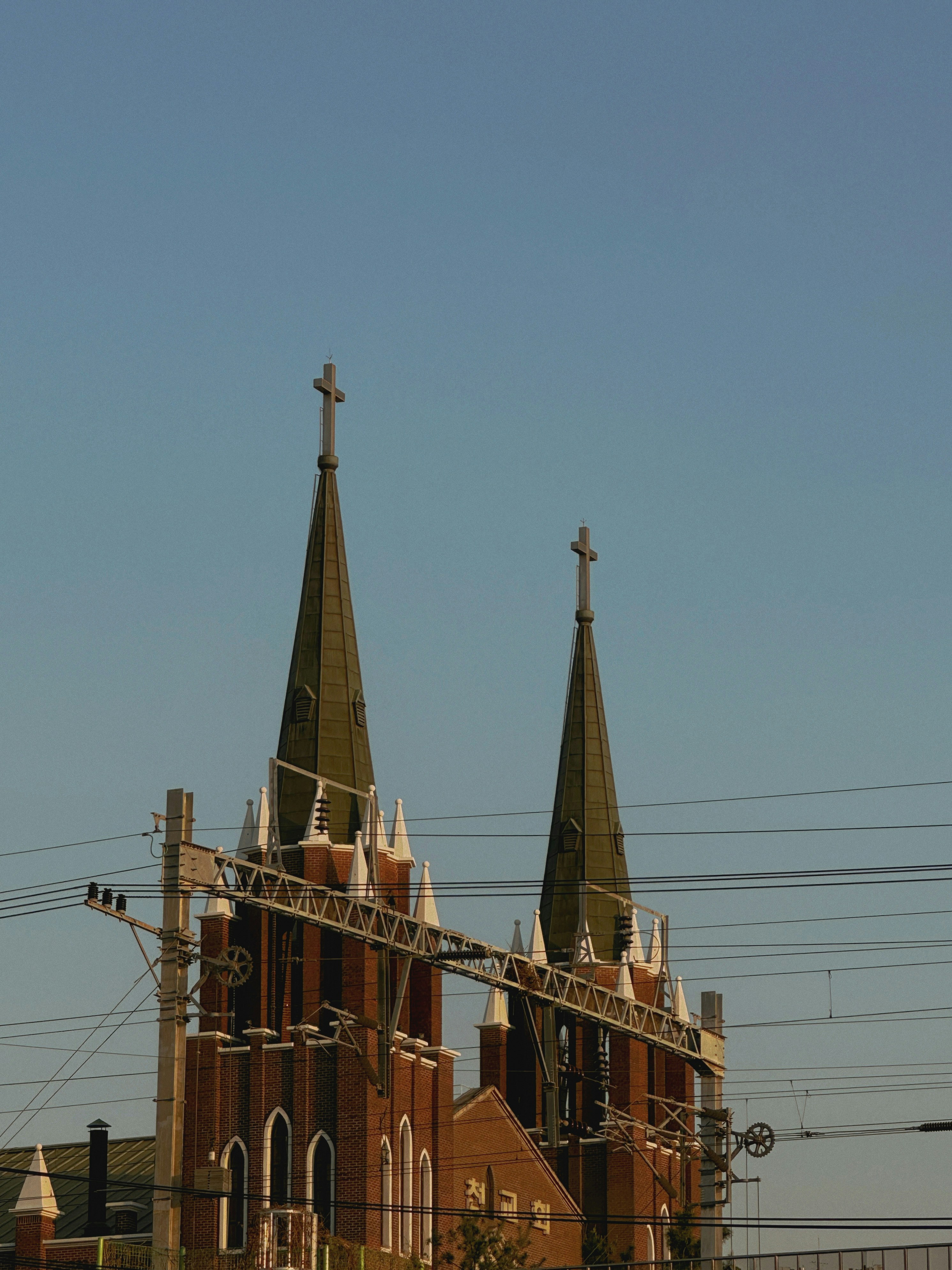 Twin Steeples Reach Toward a Clear Sky
