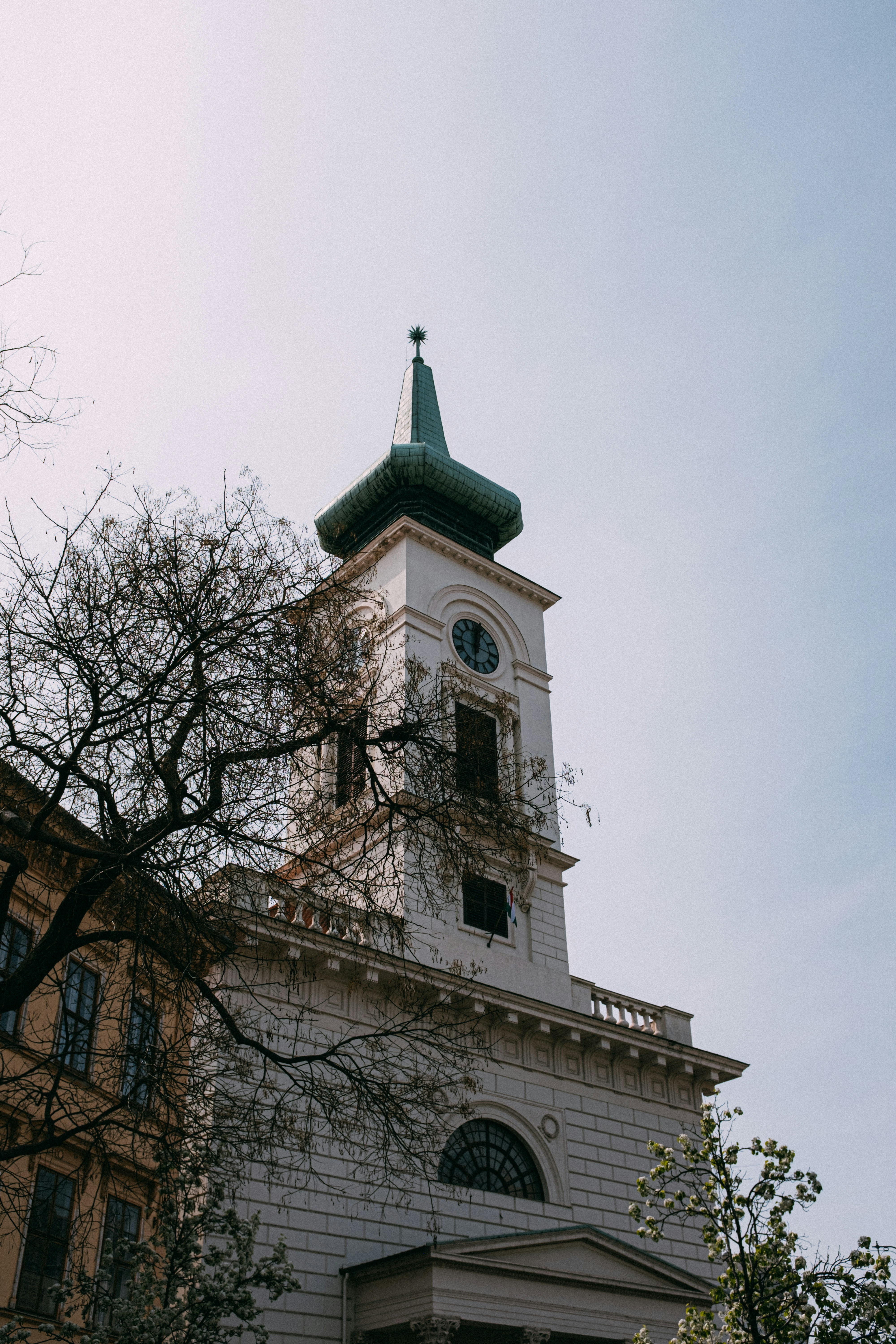 Clocktower Silhouette Under a Quiet Sky