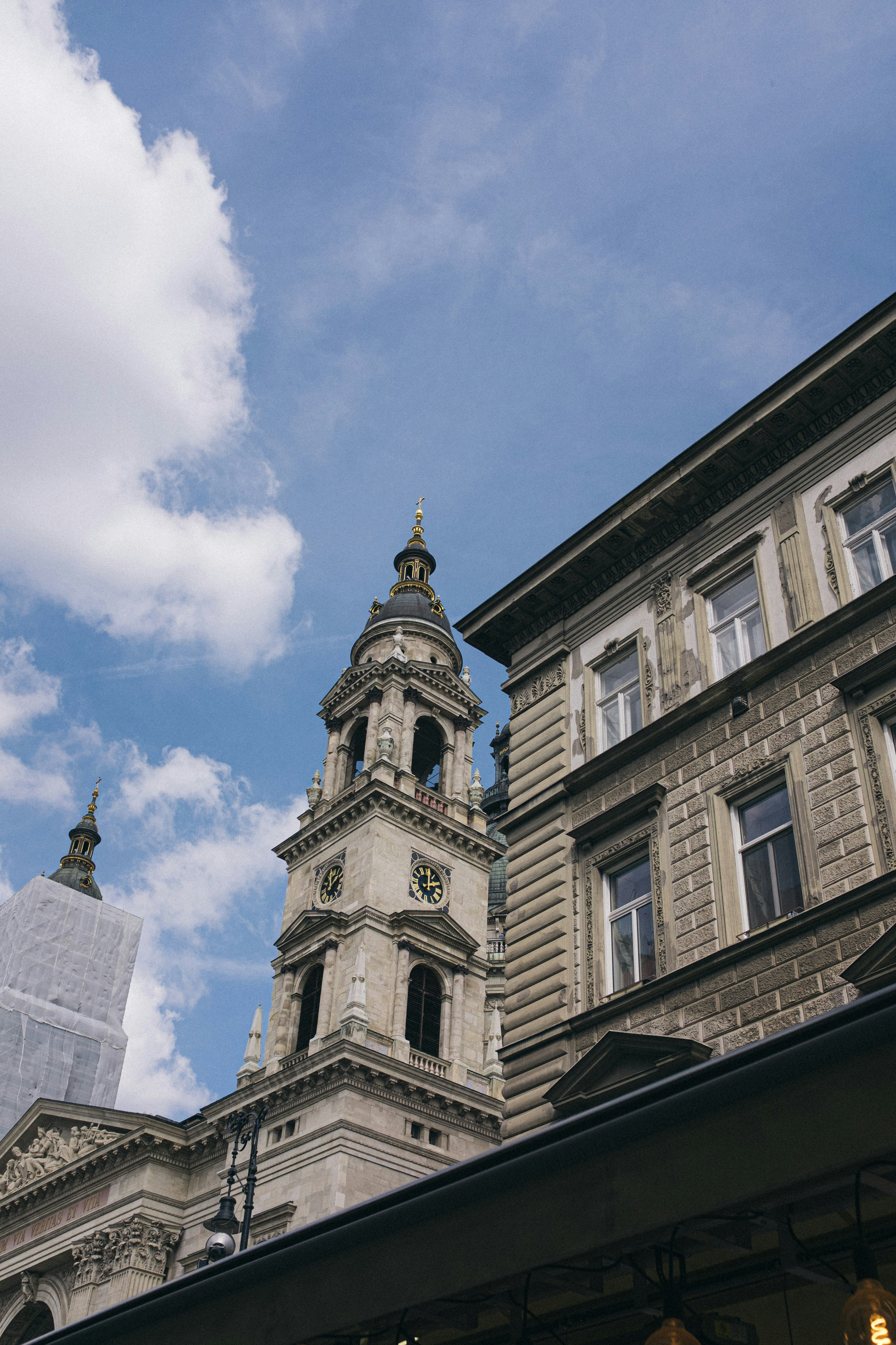 Clocktower and Gothic Facade Under an Open Sky