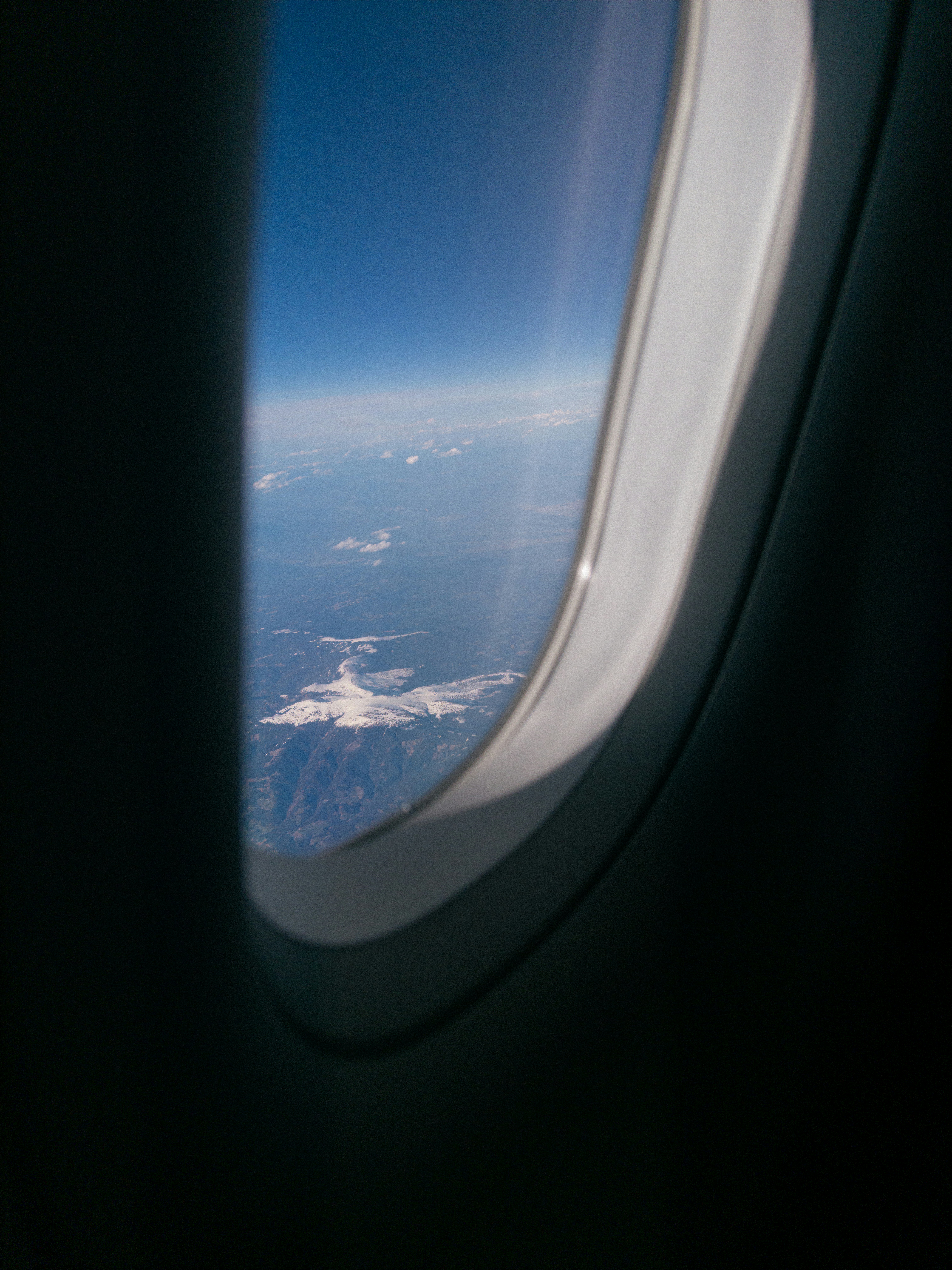 Beyond the Window: Earthlit Cloudscape from a Quiet Cabin View