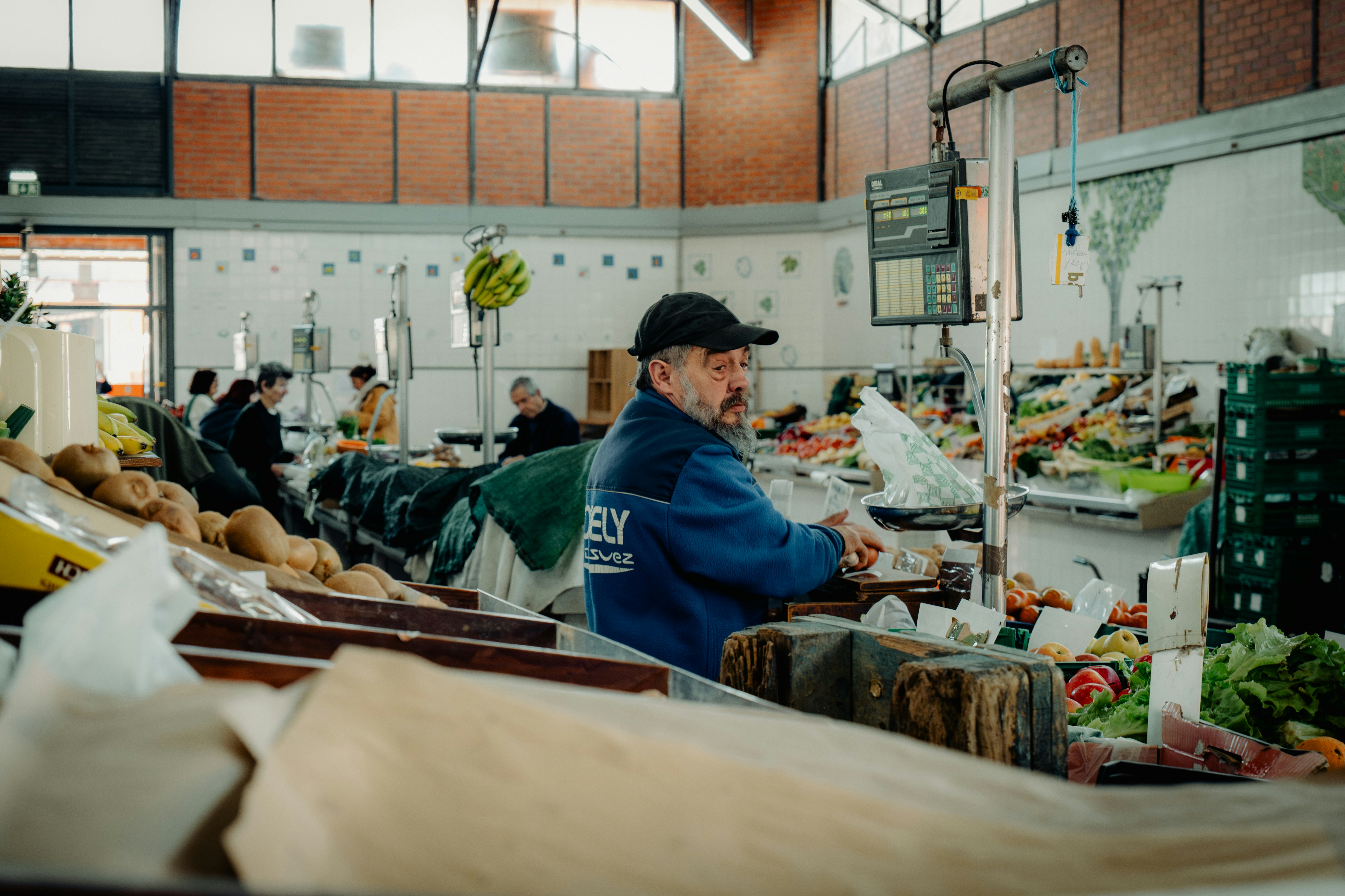 Market Vendor in Focus: A Seaside of Produce and Faces