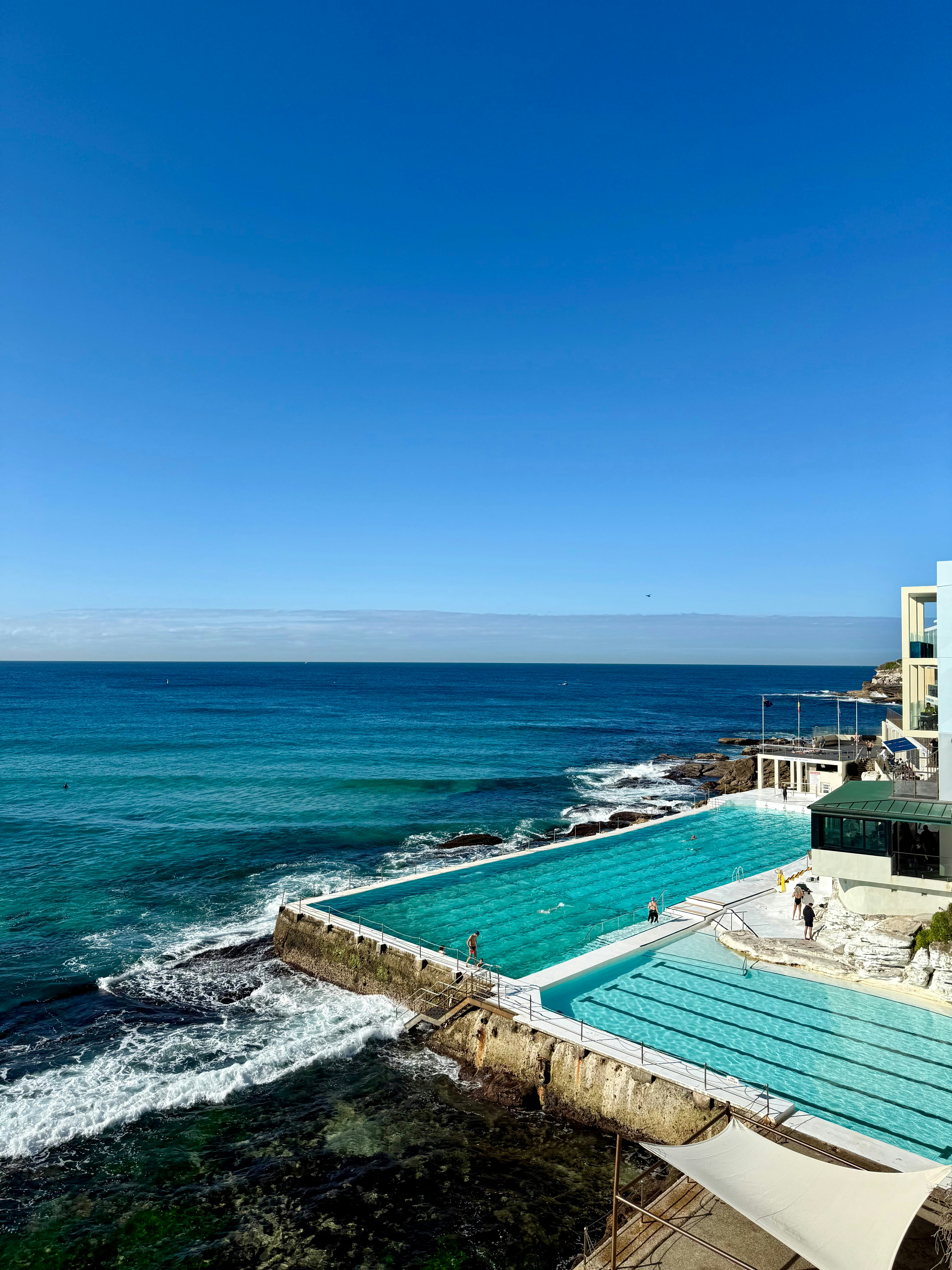Terraced Oceanfront: A Glassy Pool Meets the Deep Blue