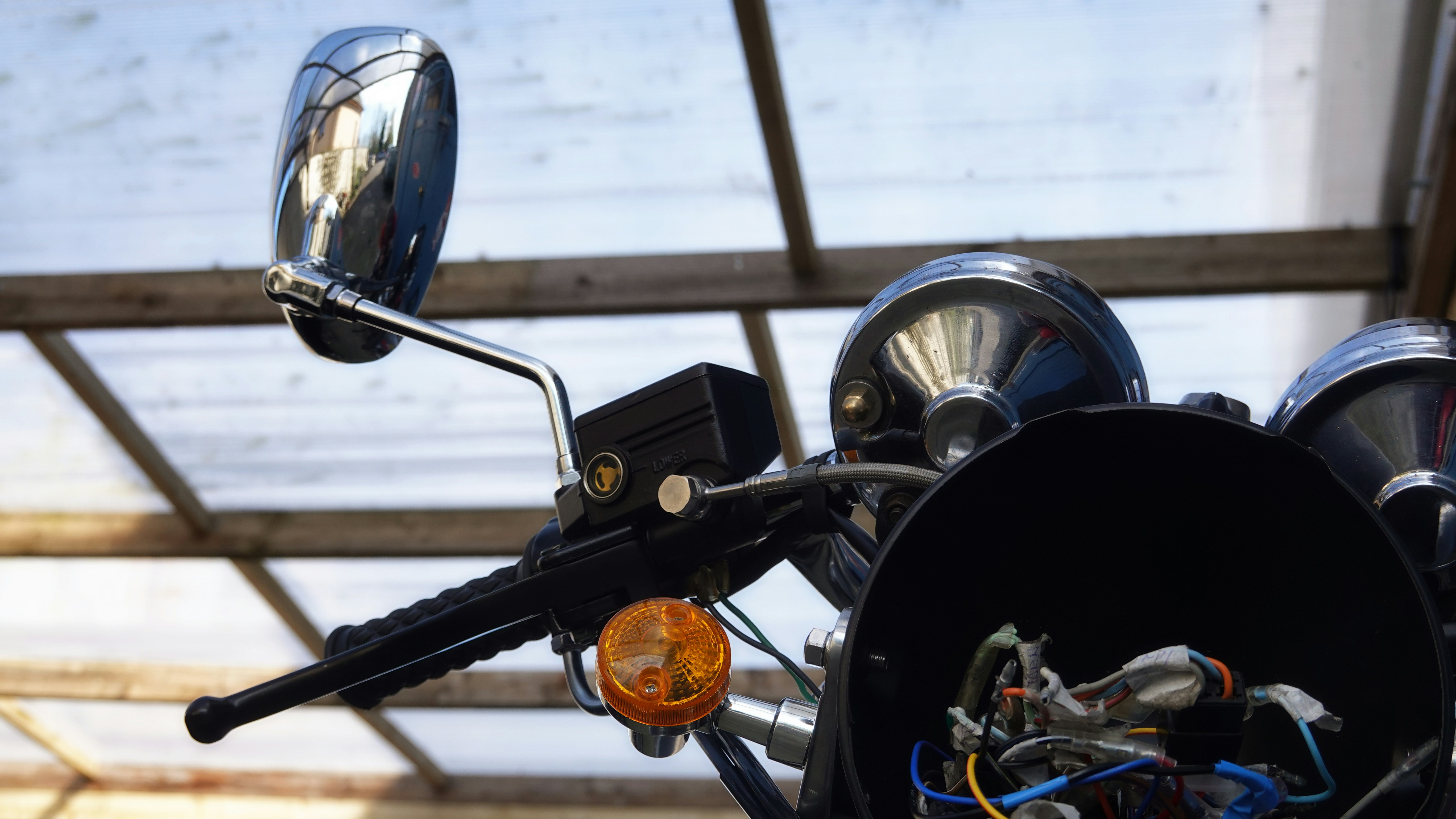 Headlight Gaze: The Mechanical Eye of a Vintage Motorcycle