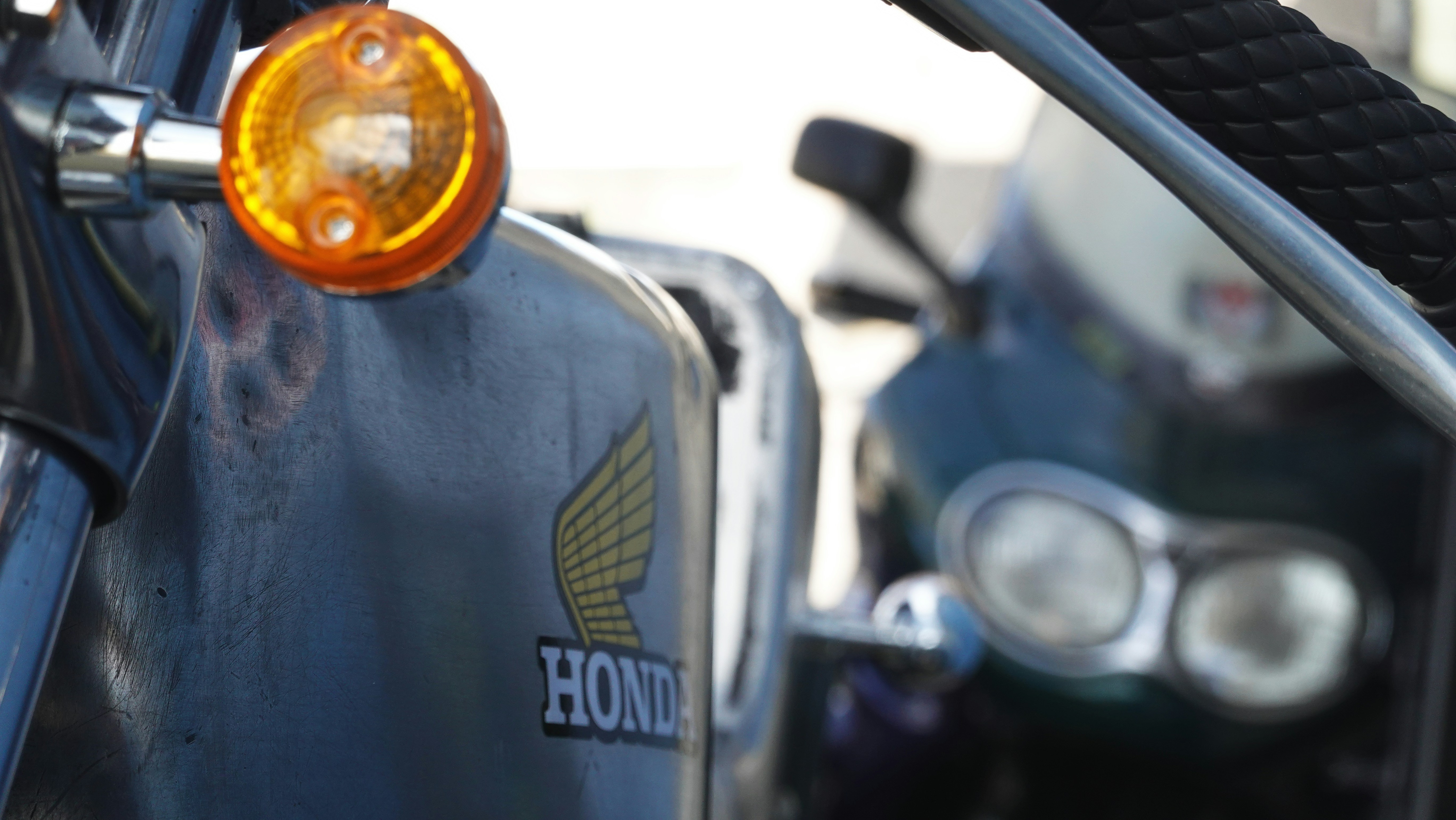 Close-up of a vintage honda motorcycle detail.