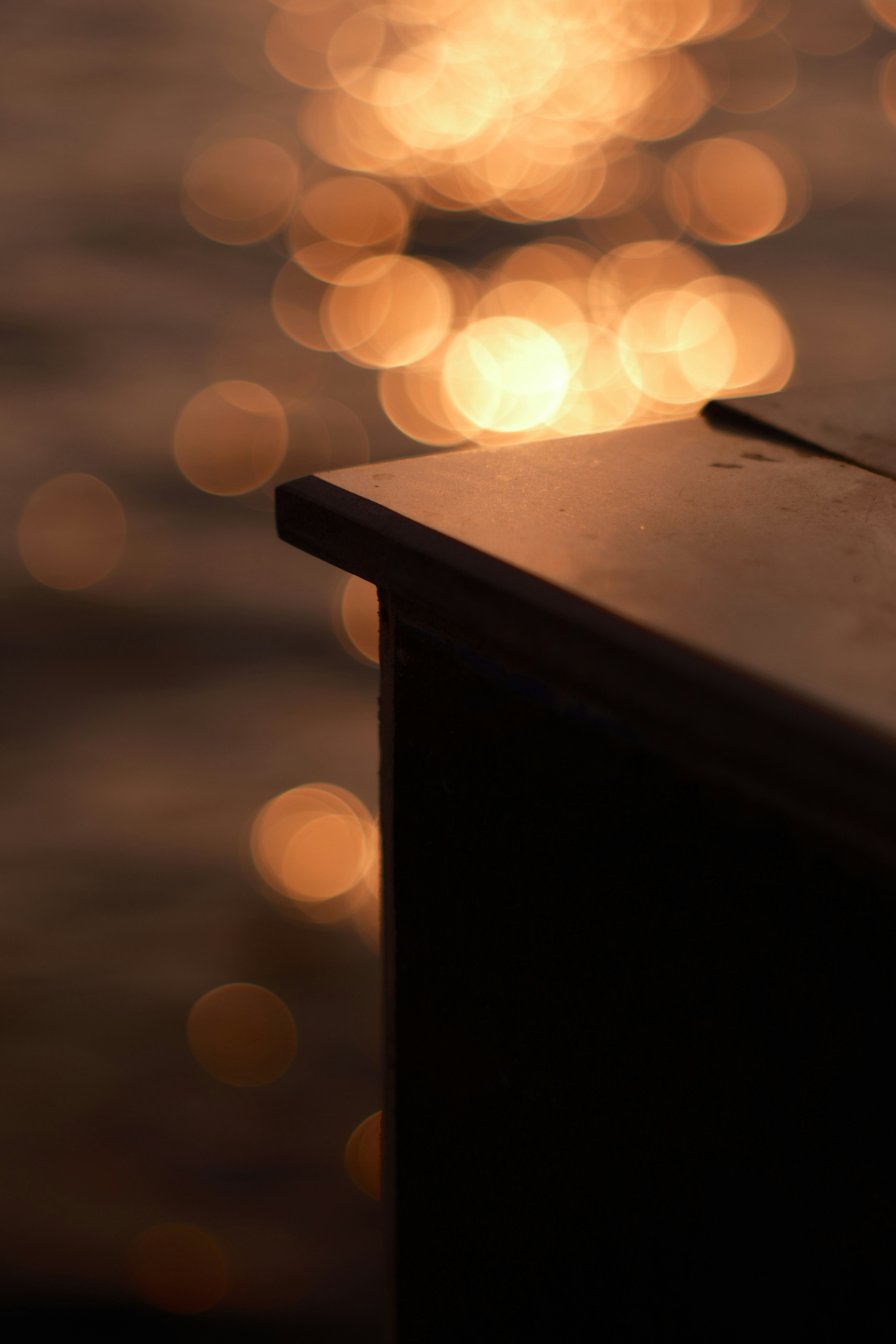 Golden Orbs on a Night-Widden Pier