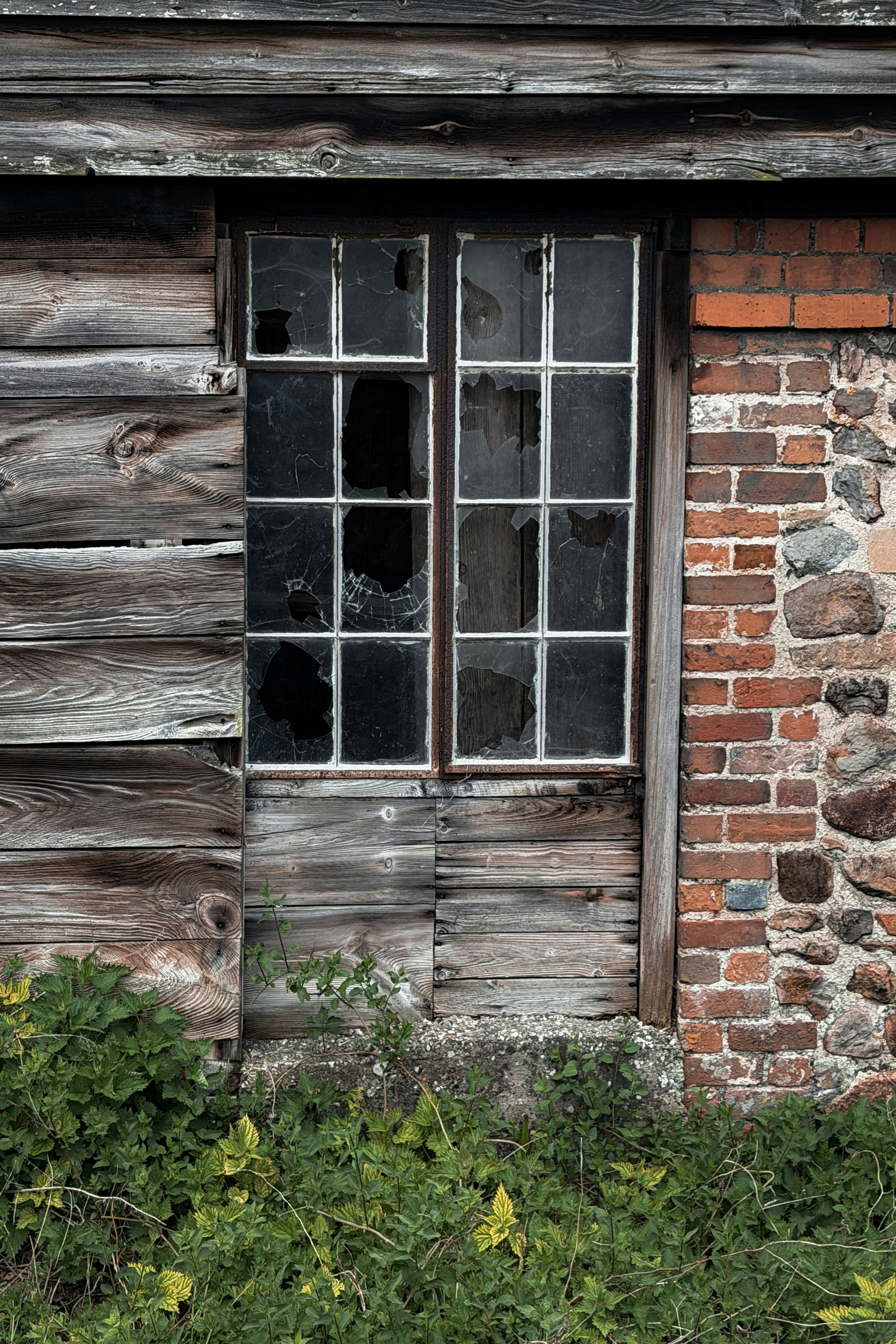 Weathered Window of a Silent Brick and Timber Wall