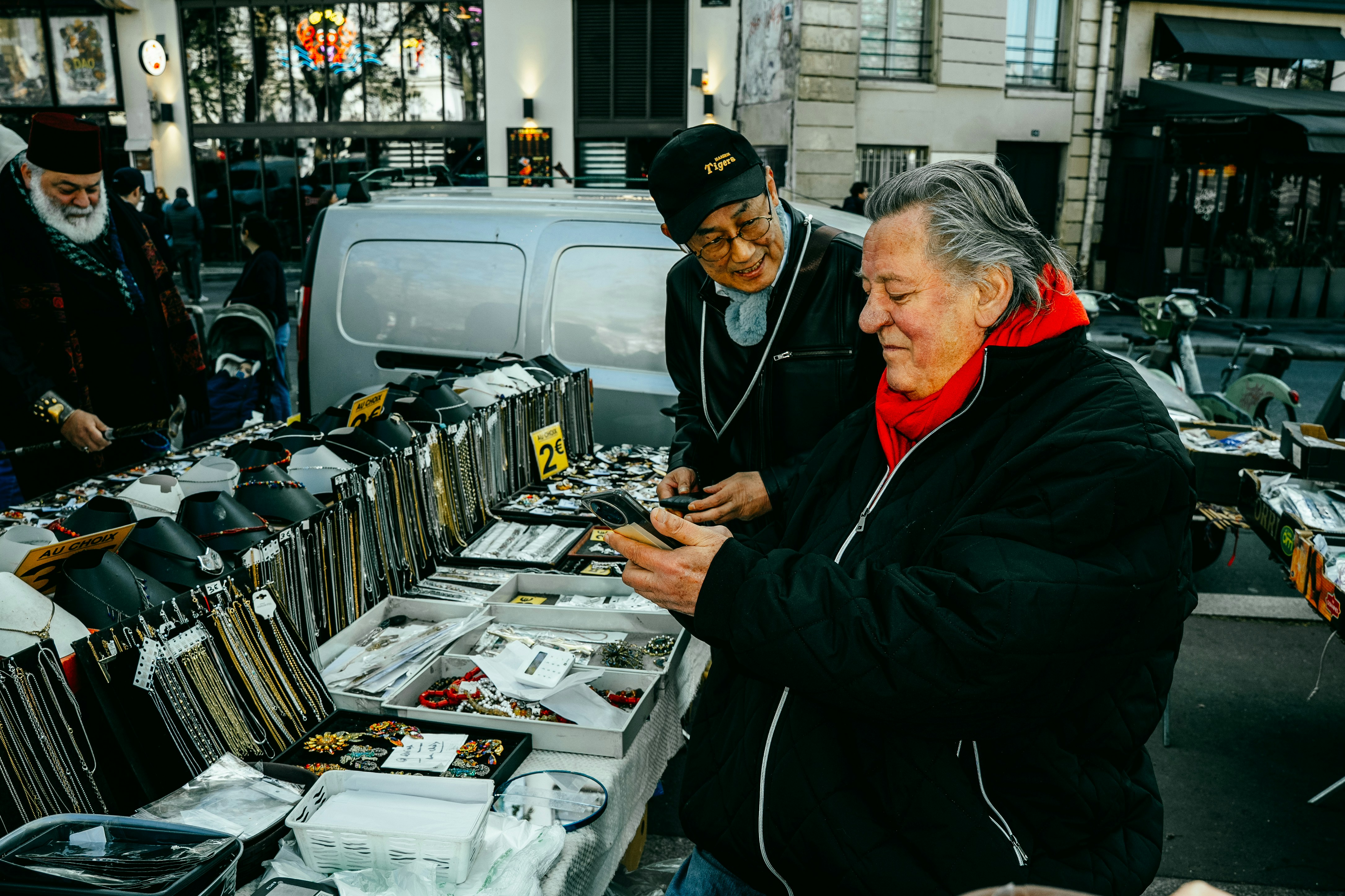 Curious Exchange at a Street-Mide Market Stall