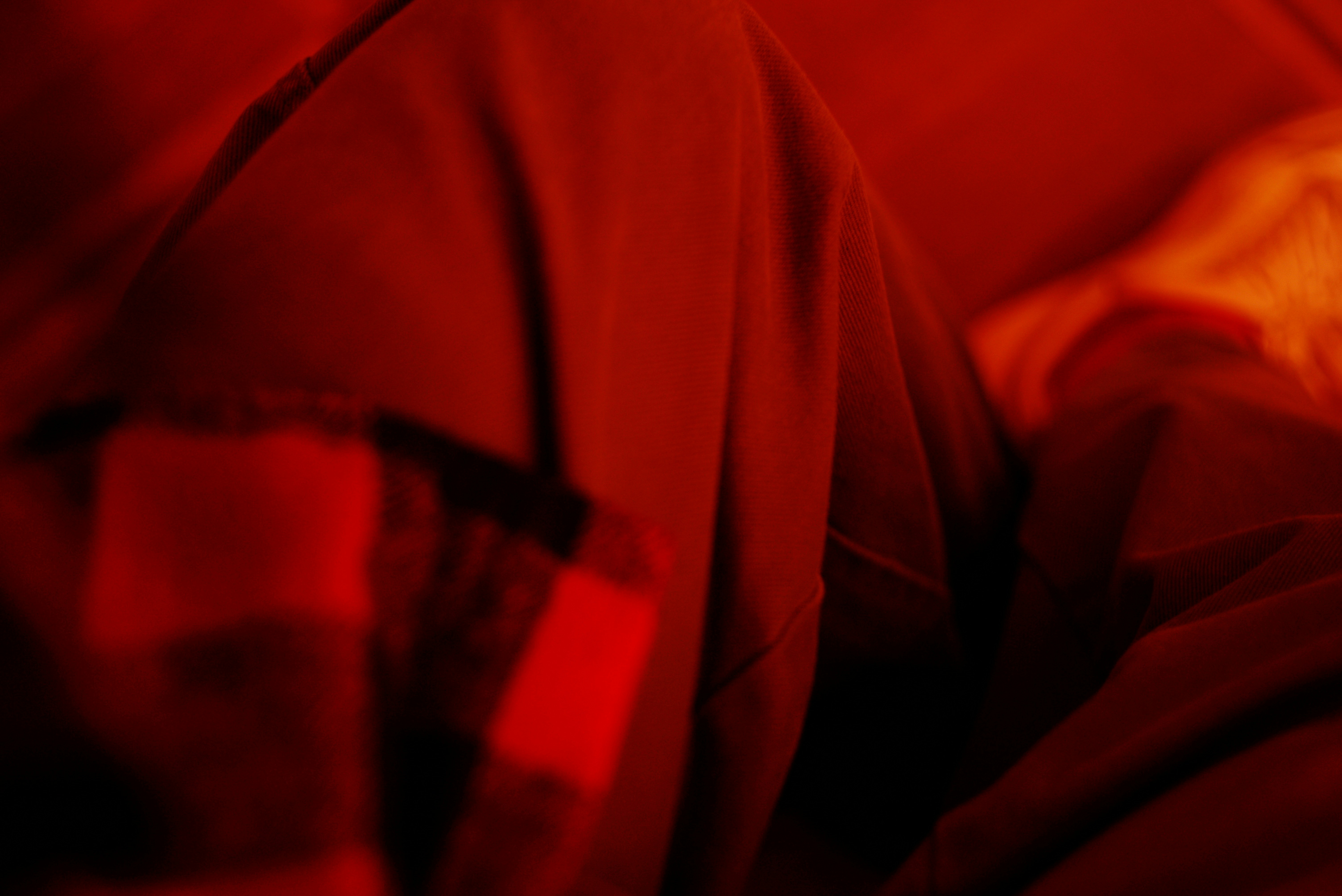 Cozy Red Threads: A Quiet Fold in the Fabric of Night