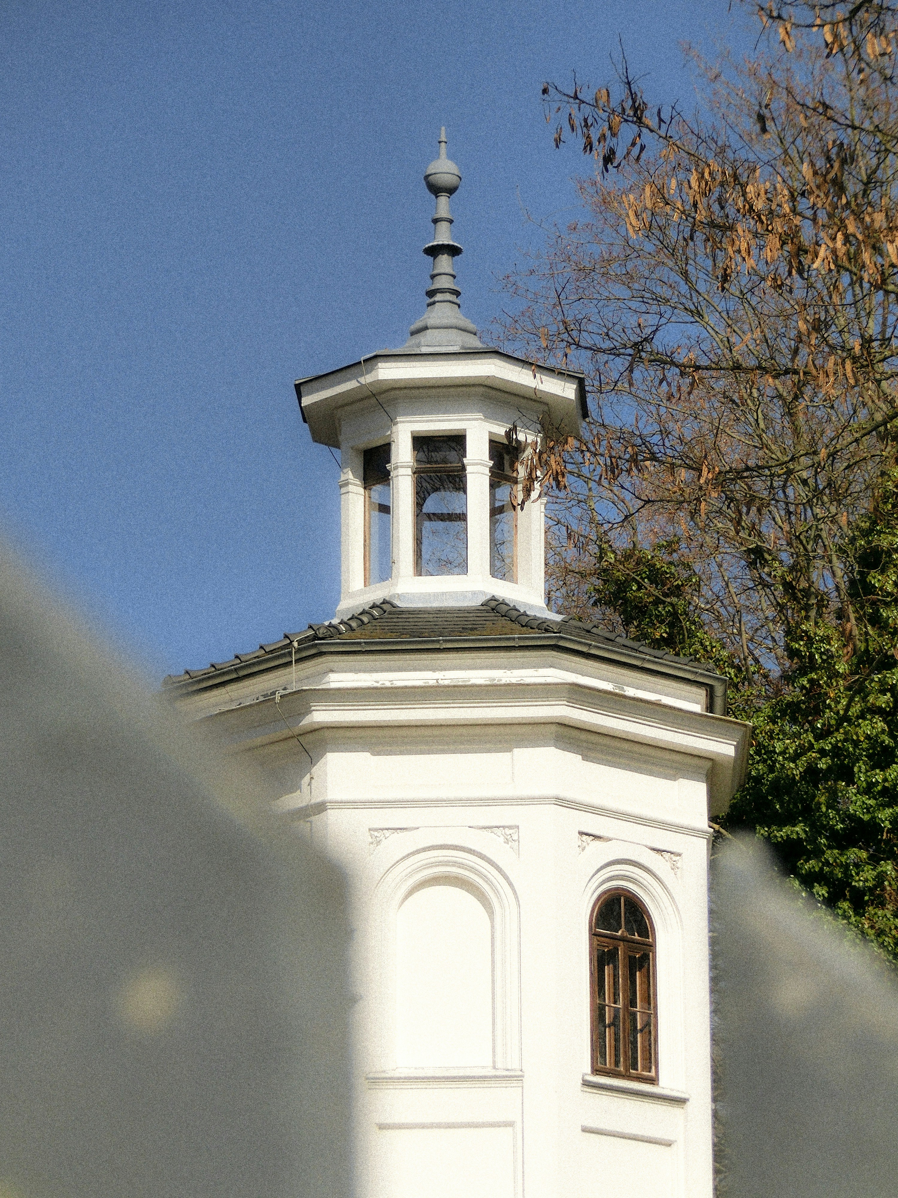Cupola at Dusk: A White Architectural Tower Against a Clear Sky