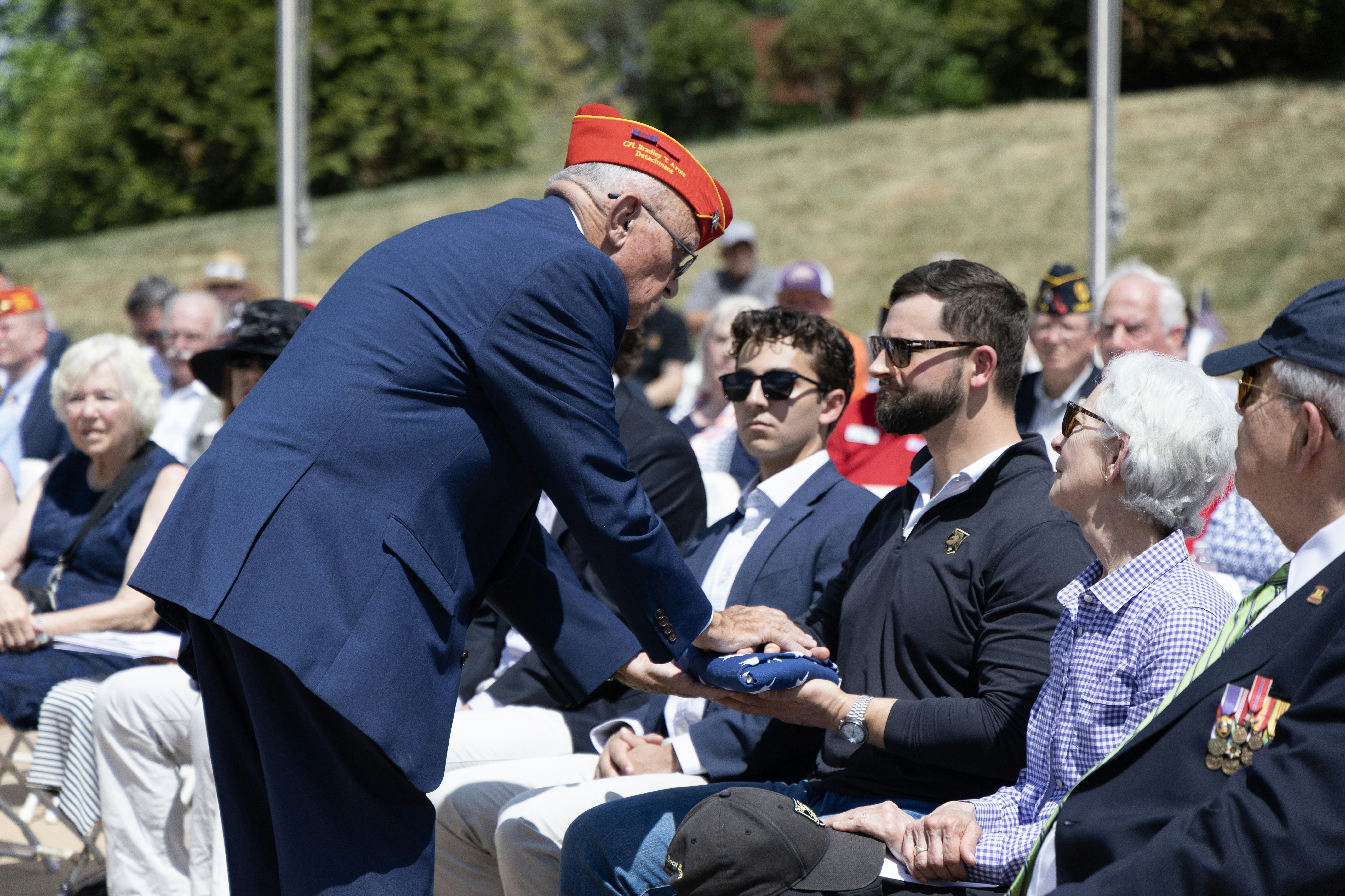 Handshake Across the Row: A Veteran Ceremony Moment