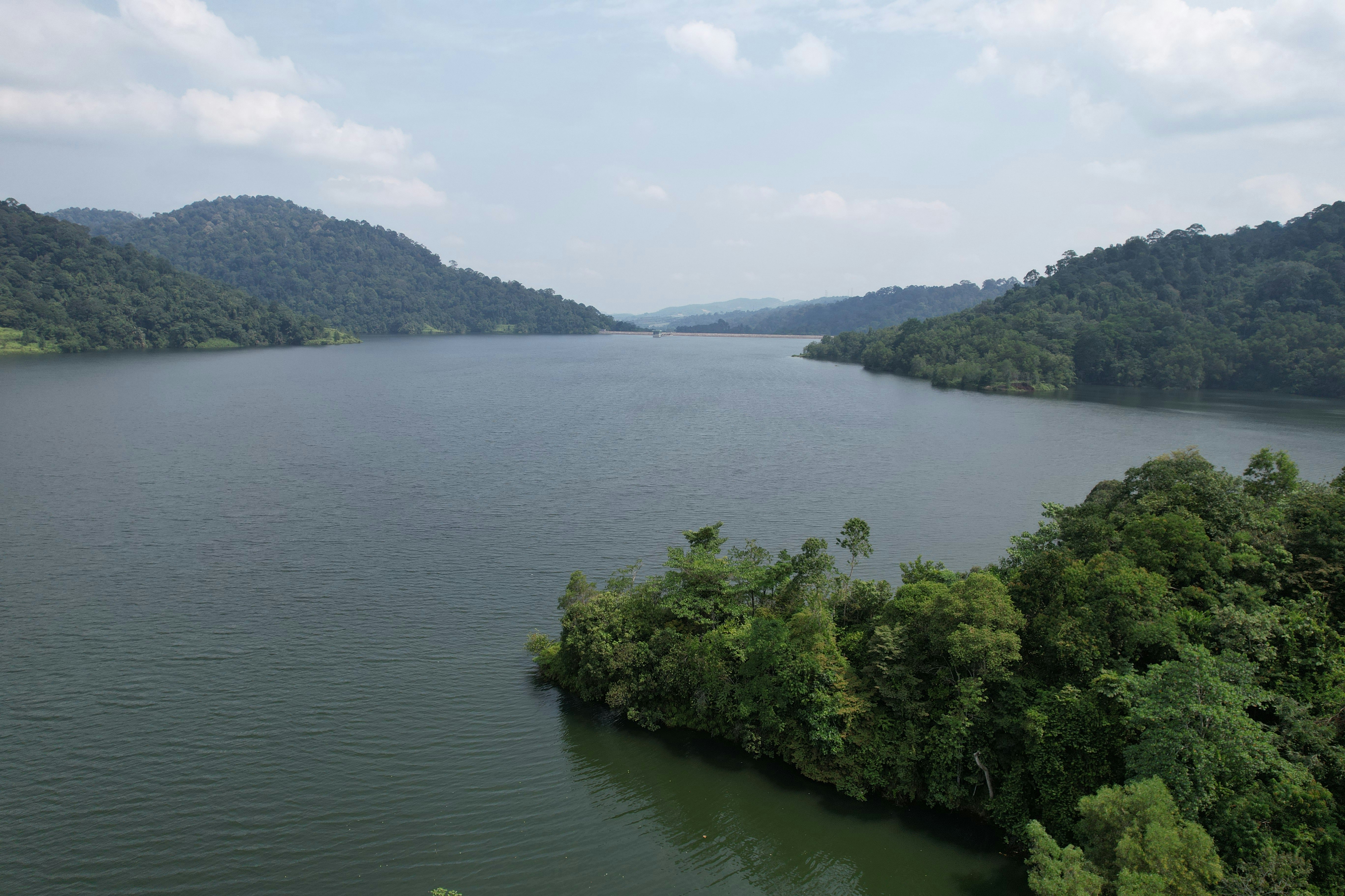 A Quiet Corridor: Aerial View Over a Serene Reservoir